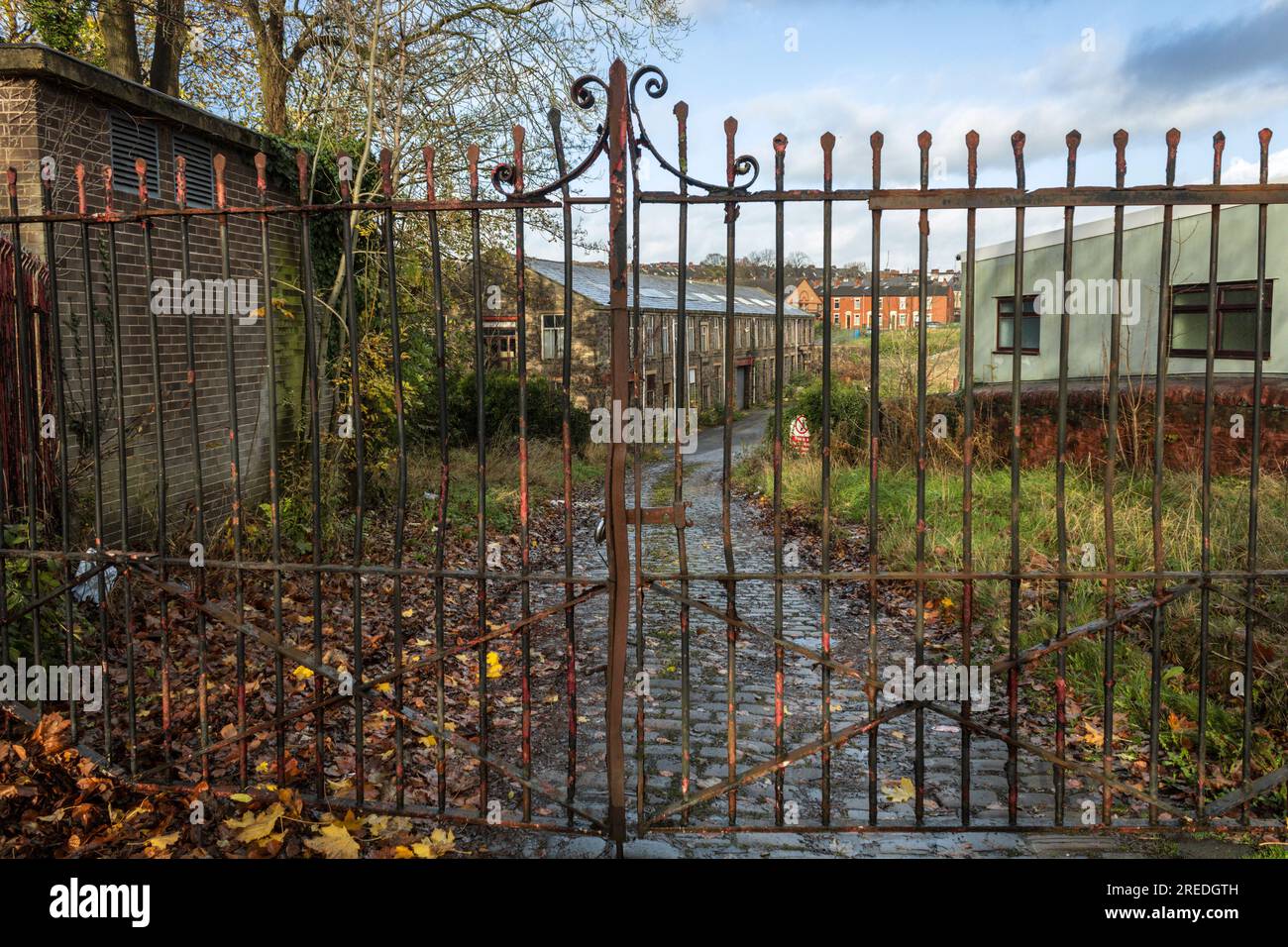 Metal gates leading to a former cotton mill. Cob Wall, Blackburn Stock ...