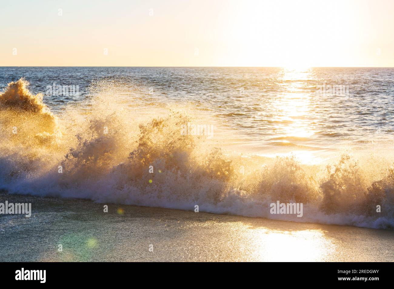 Blue wave on the beach. Dramatic natural background Stock Photo - Alamy