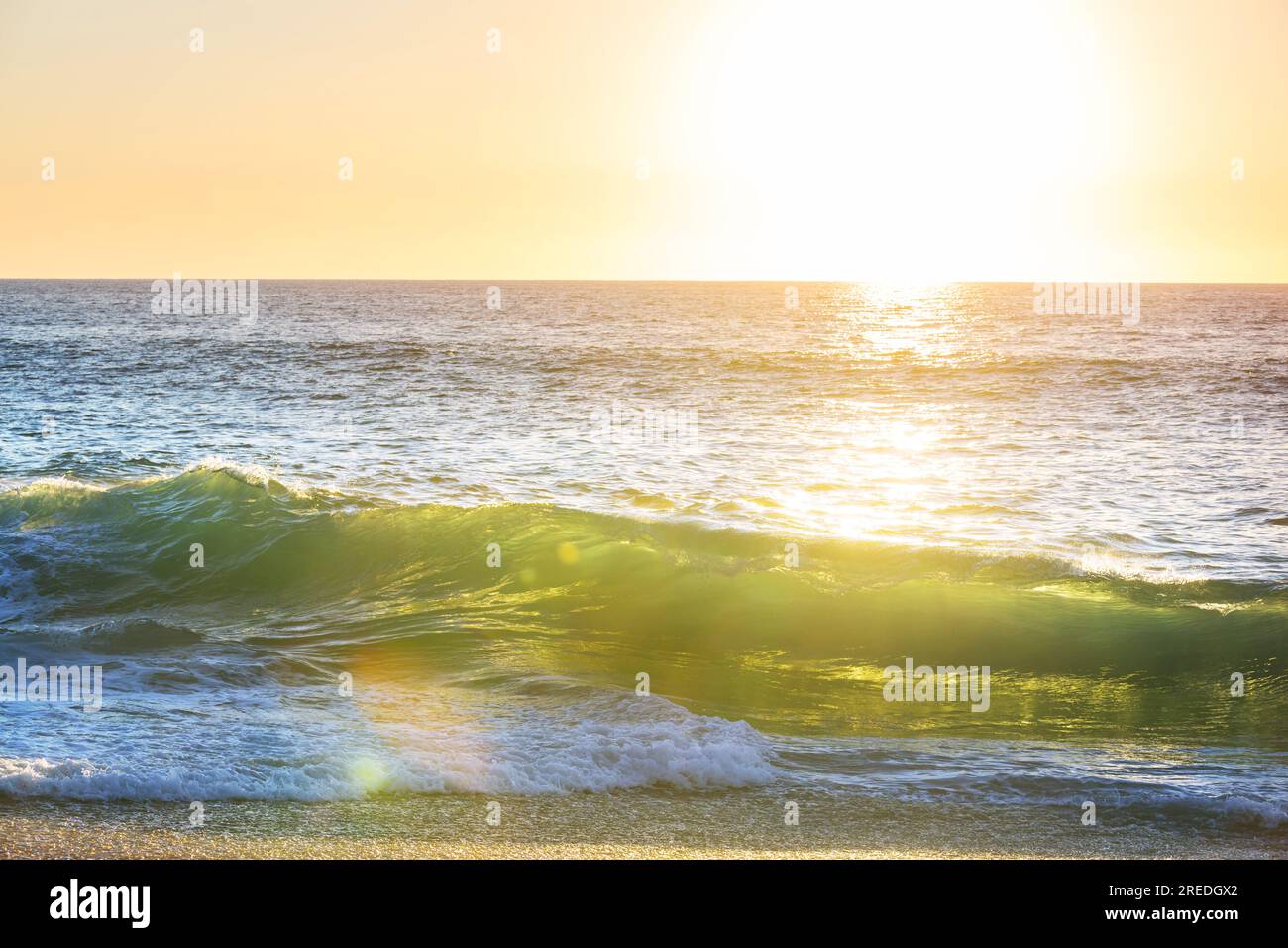 Blue wave on the beach. Dramatic natural background Stock Photo - Alamy