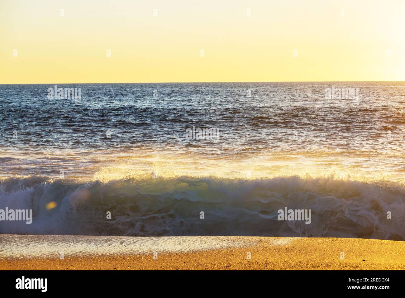 Blue wave on the beach. Dramatic natural background Stock Photo - Alamy