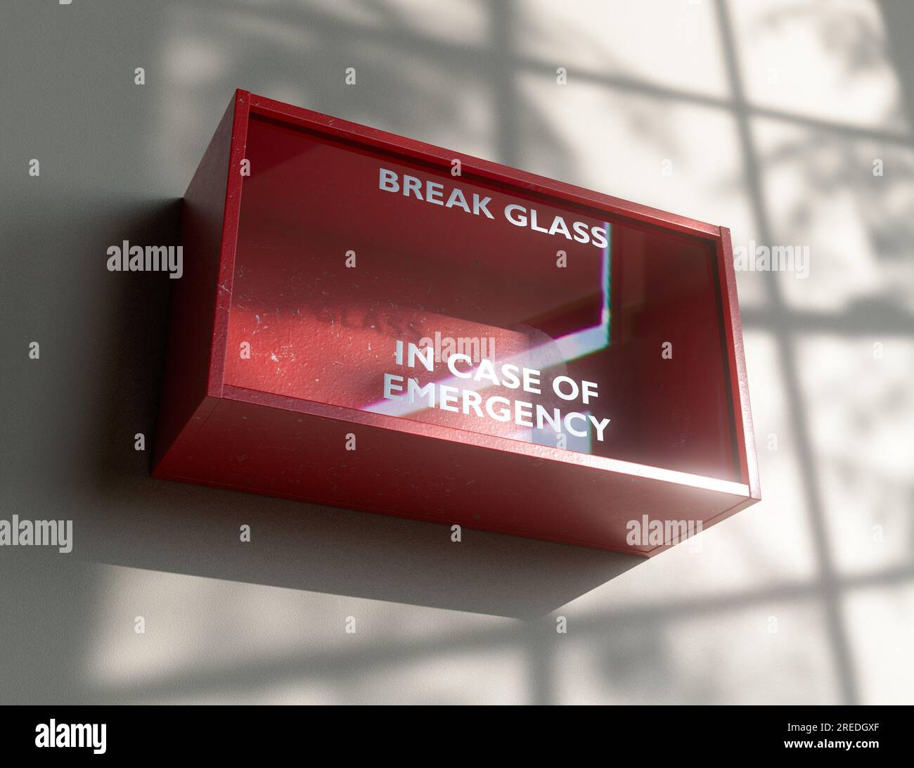 An empty red emergency box with an in case of emergency breakable glass ...
