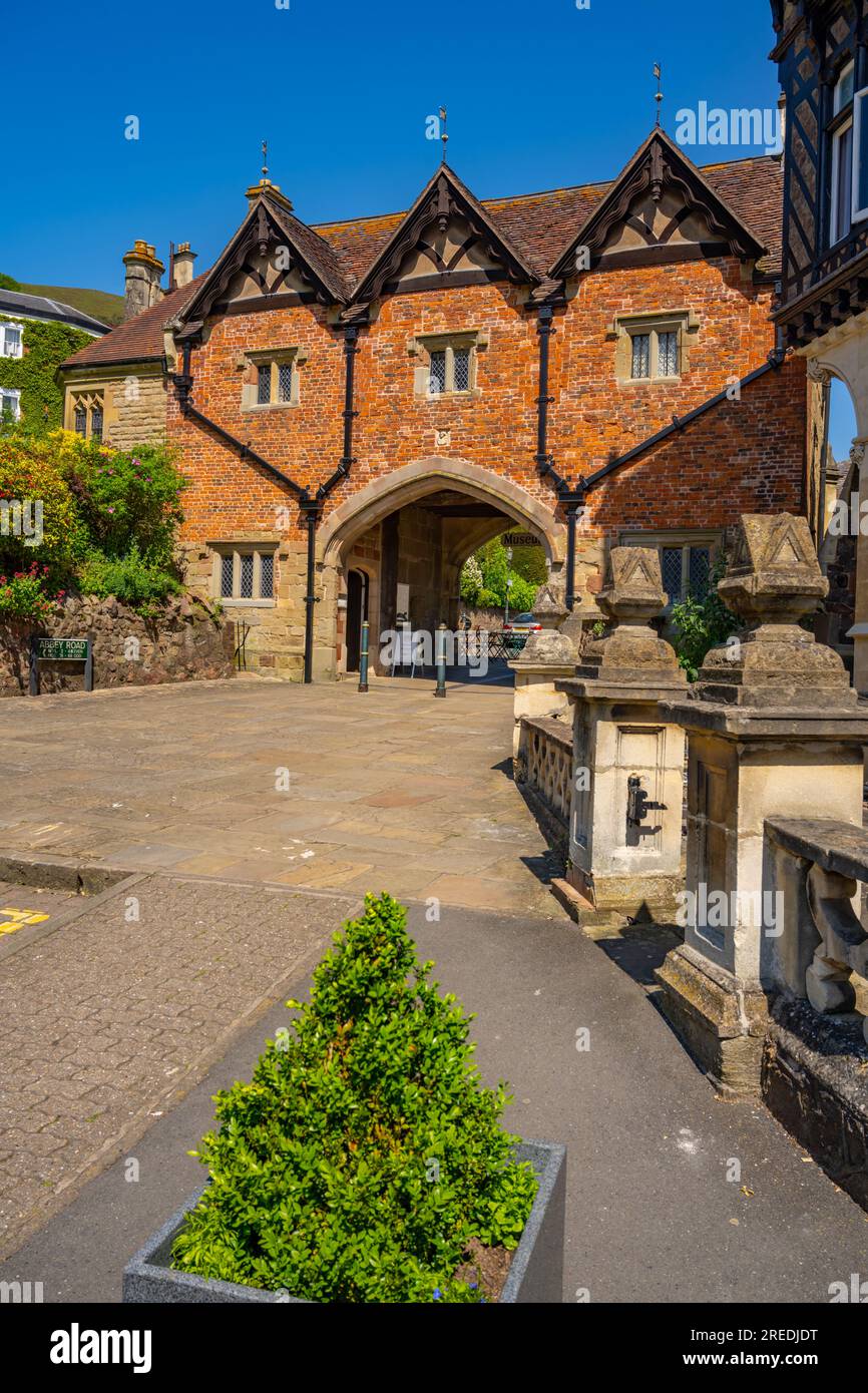 The Malvern Museum in a 15th-century brick gatehouse. Next to The Abbey ...