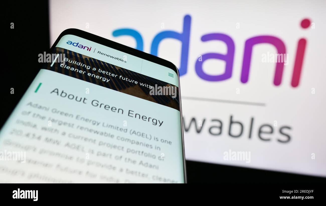 Mobile phone with website of Indian company Adani Green Energy Limited ...
