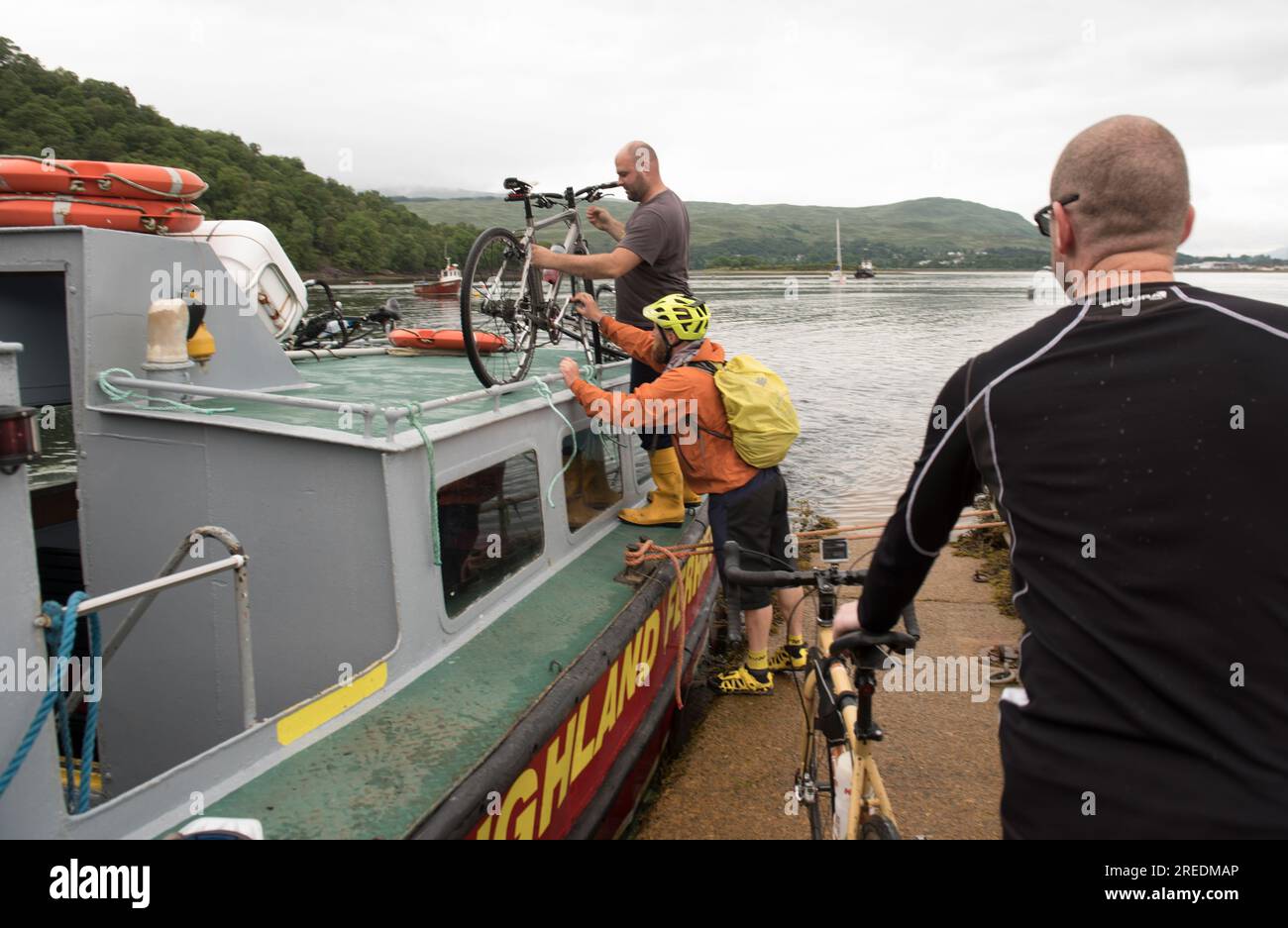 Bicycles are loaded onto the passenger ferry boat from Camusnagaul to ...