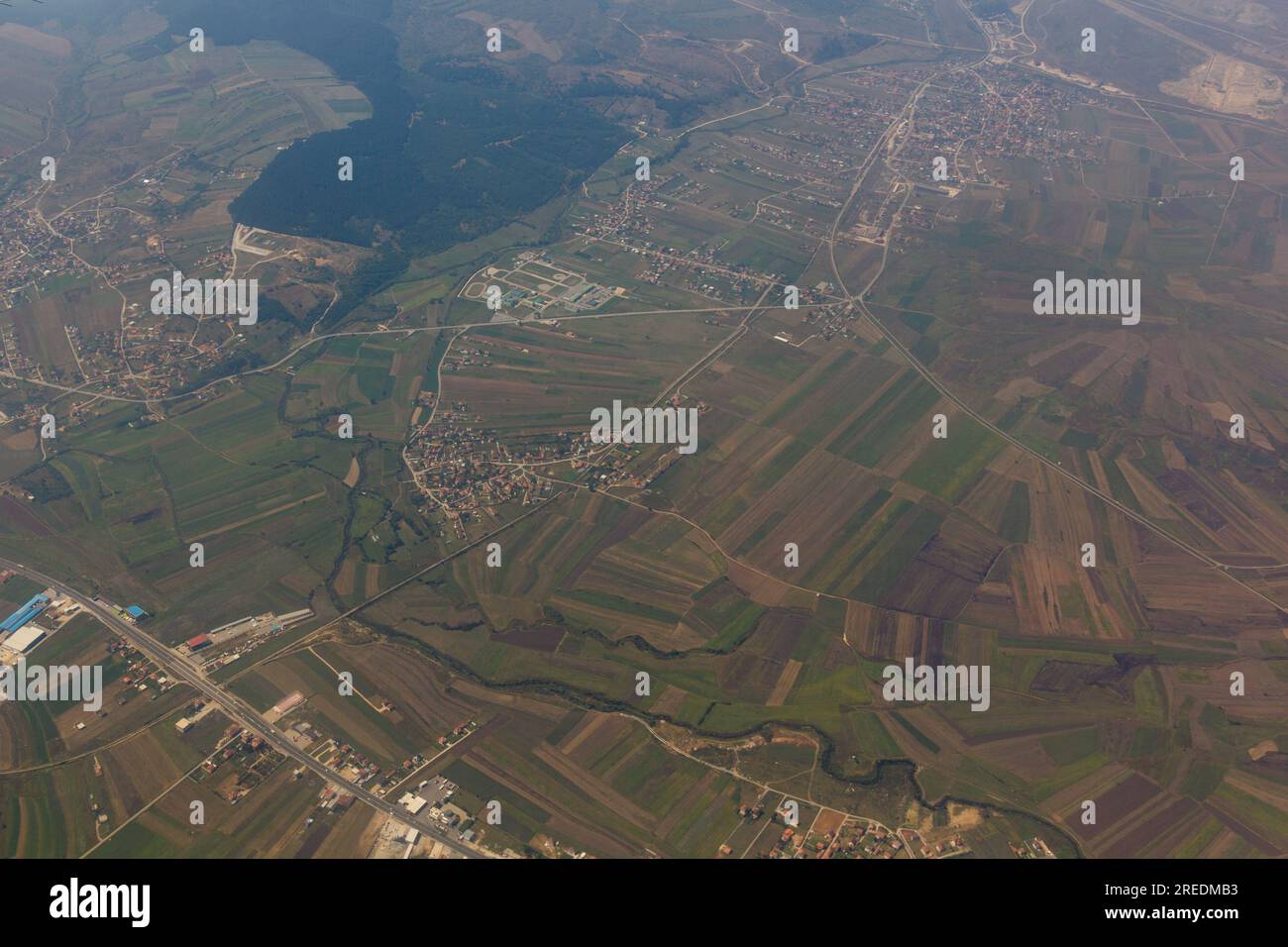 Aerial view of villages Bardh i Vogel and Pomazotin near Pristina ...