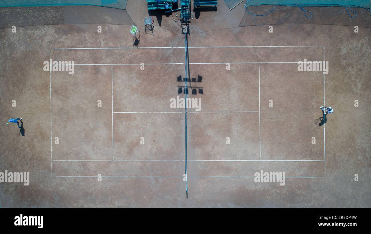 Aerial view of tennis game on court top view Stock Photo - Alamy