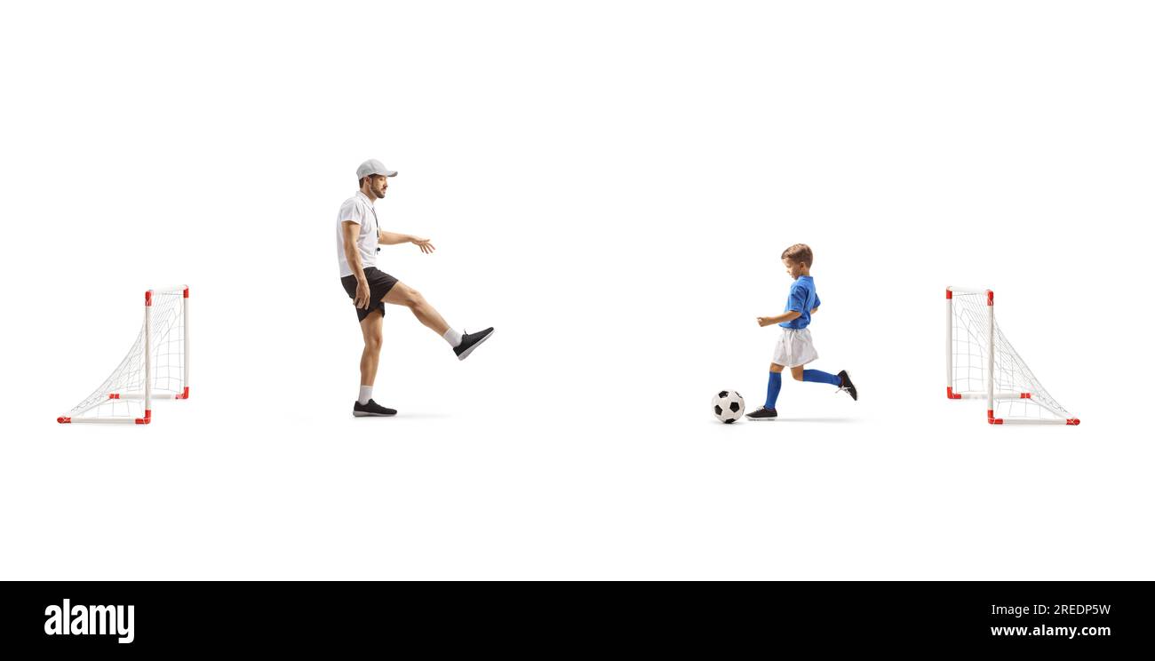 Boy practicing football with a coach isolated on white background Stock ...
