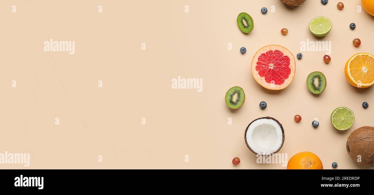 Composition with different fruits and berries on beige background with ...