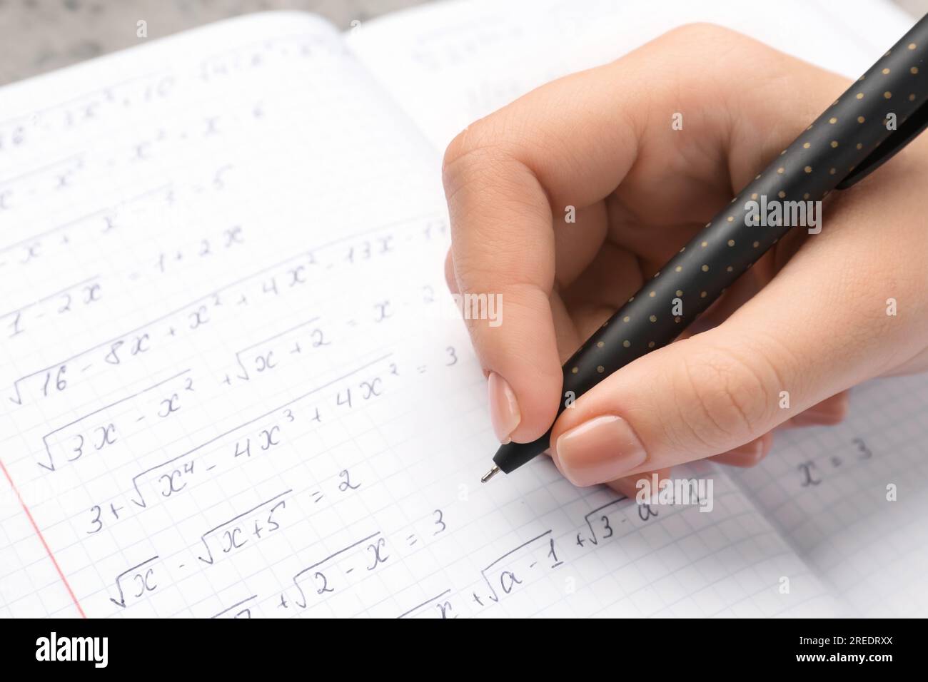 Woman writing maths formulas hi-res stock photography and images - Alamy