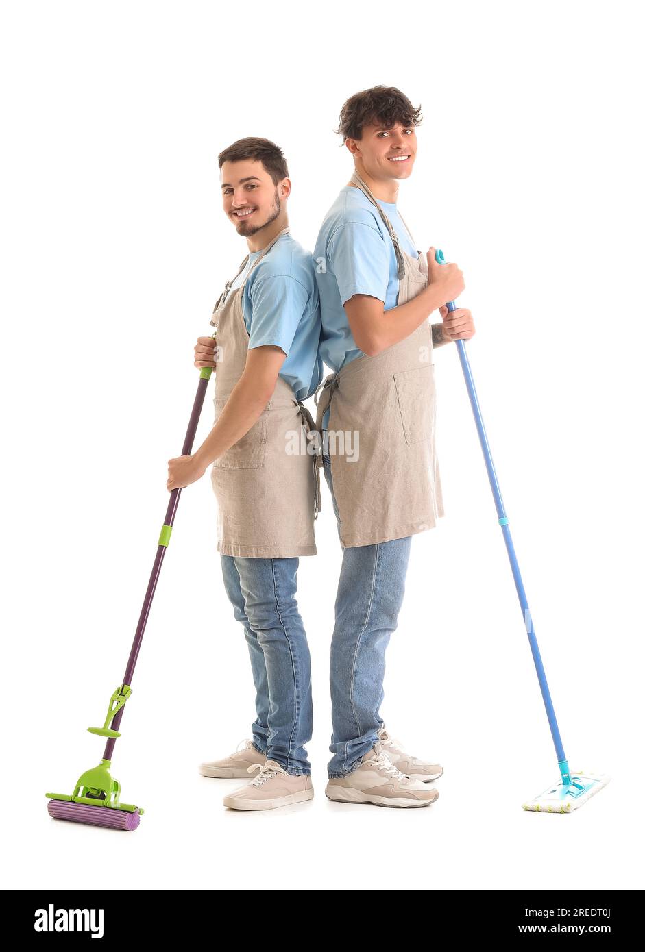 Male janitors with mops on white background Stock Photo - Alamy