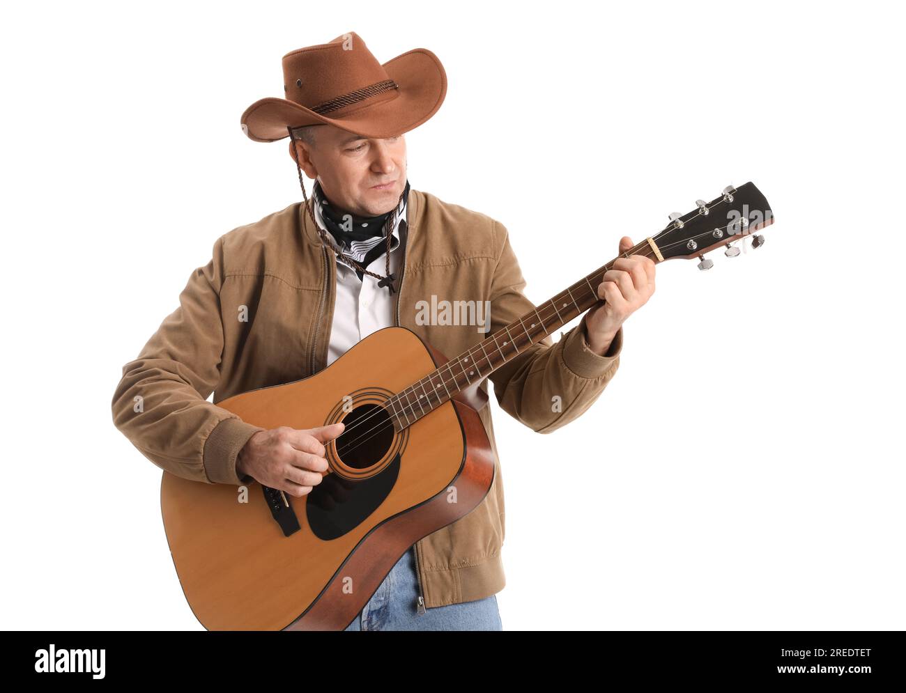 Mature cowboy playing guitar on white background Stock Photo - Alamy