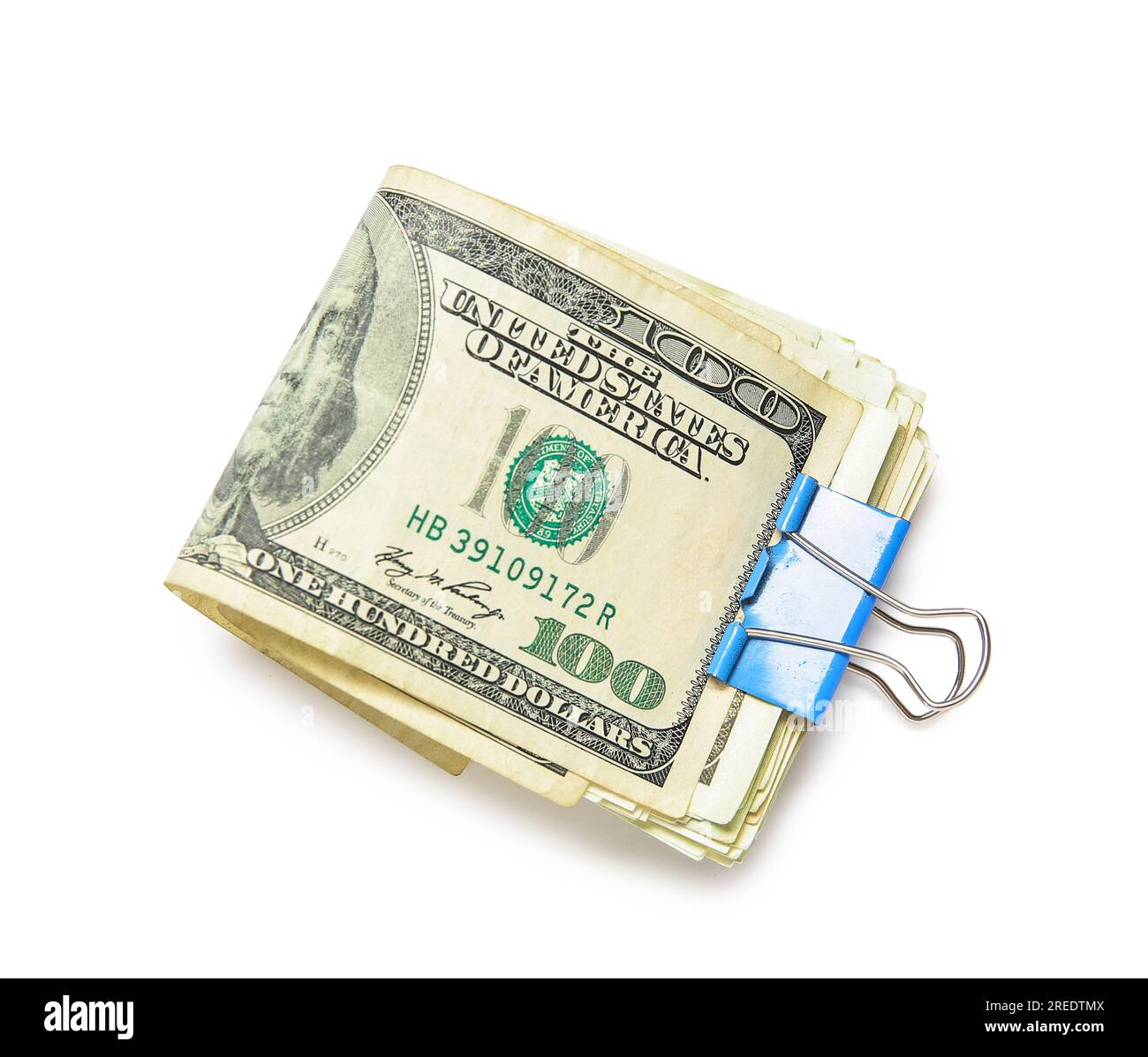 Dollar banknotes with binder clip on white background Stock Photo - Alamy