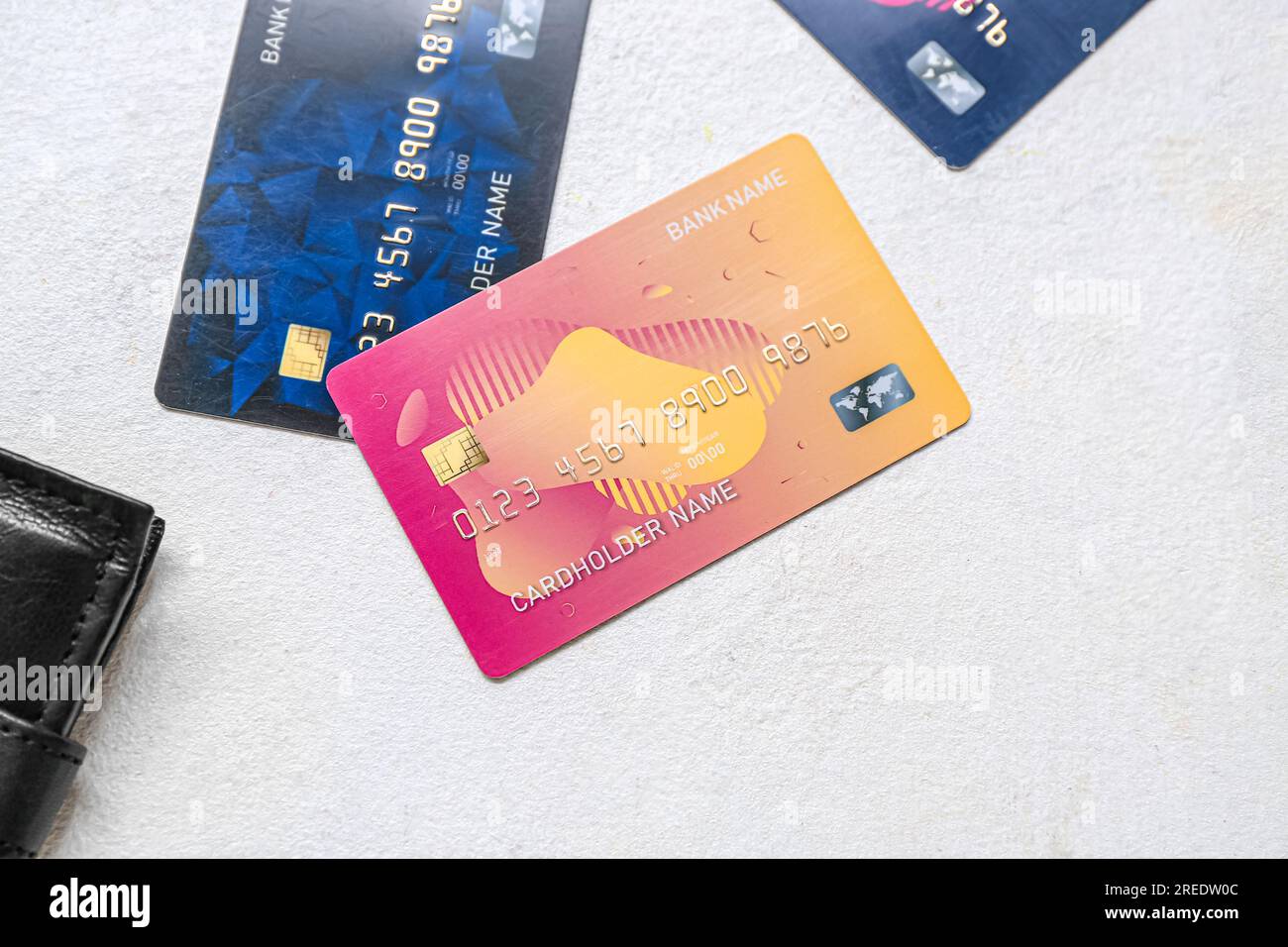Many credit cards on white background Stock Photo - Alamy