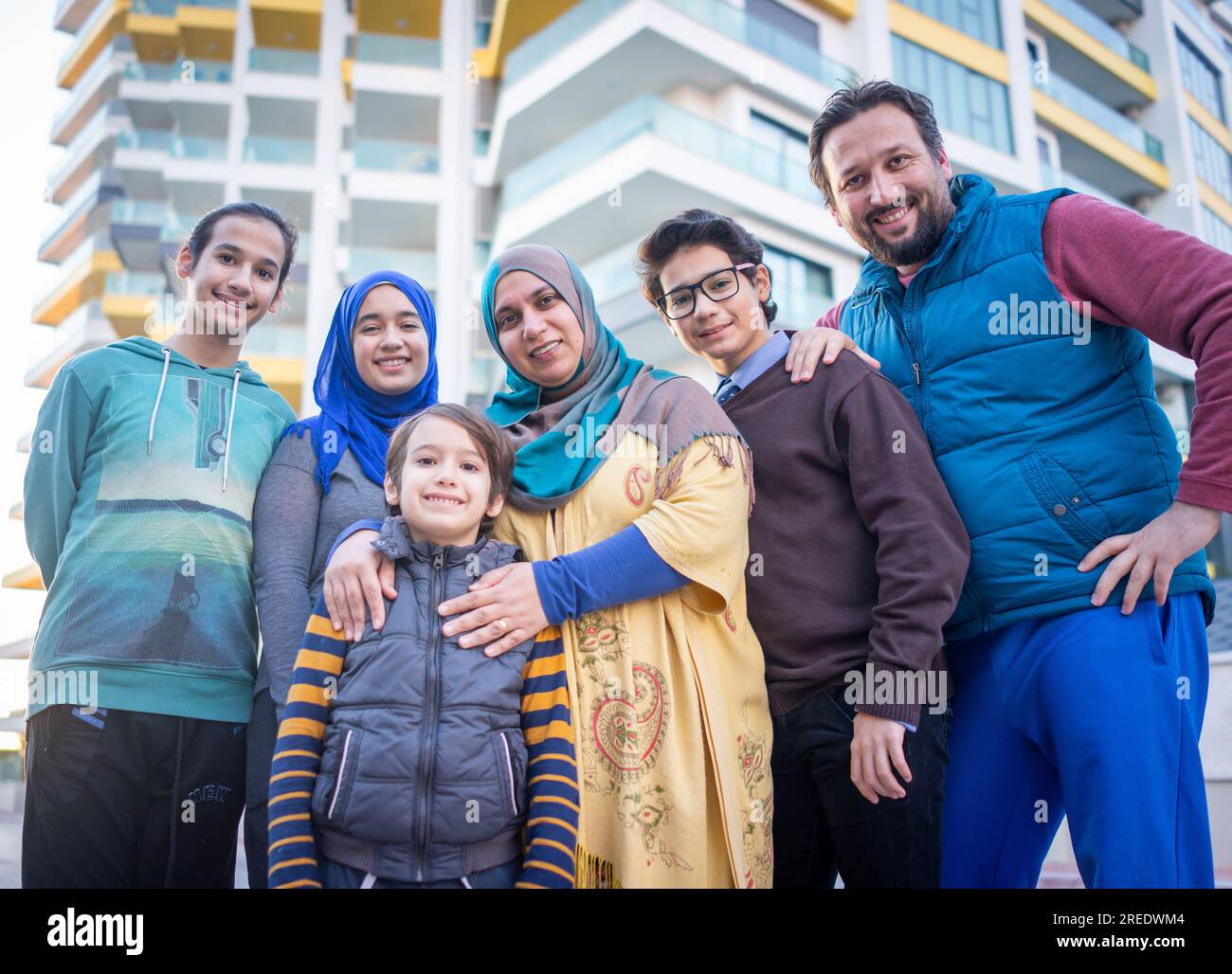 Real Muslim family on city street together Stock Photo - Alamy
