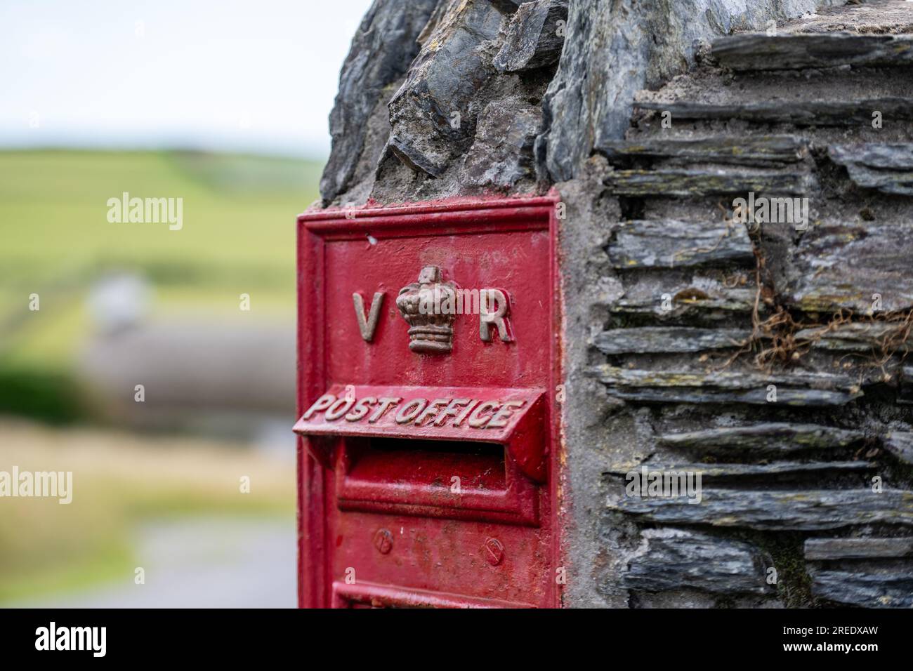 An antique cast iron post box dating back to Queen Victoria, still in ...