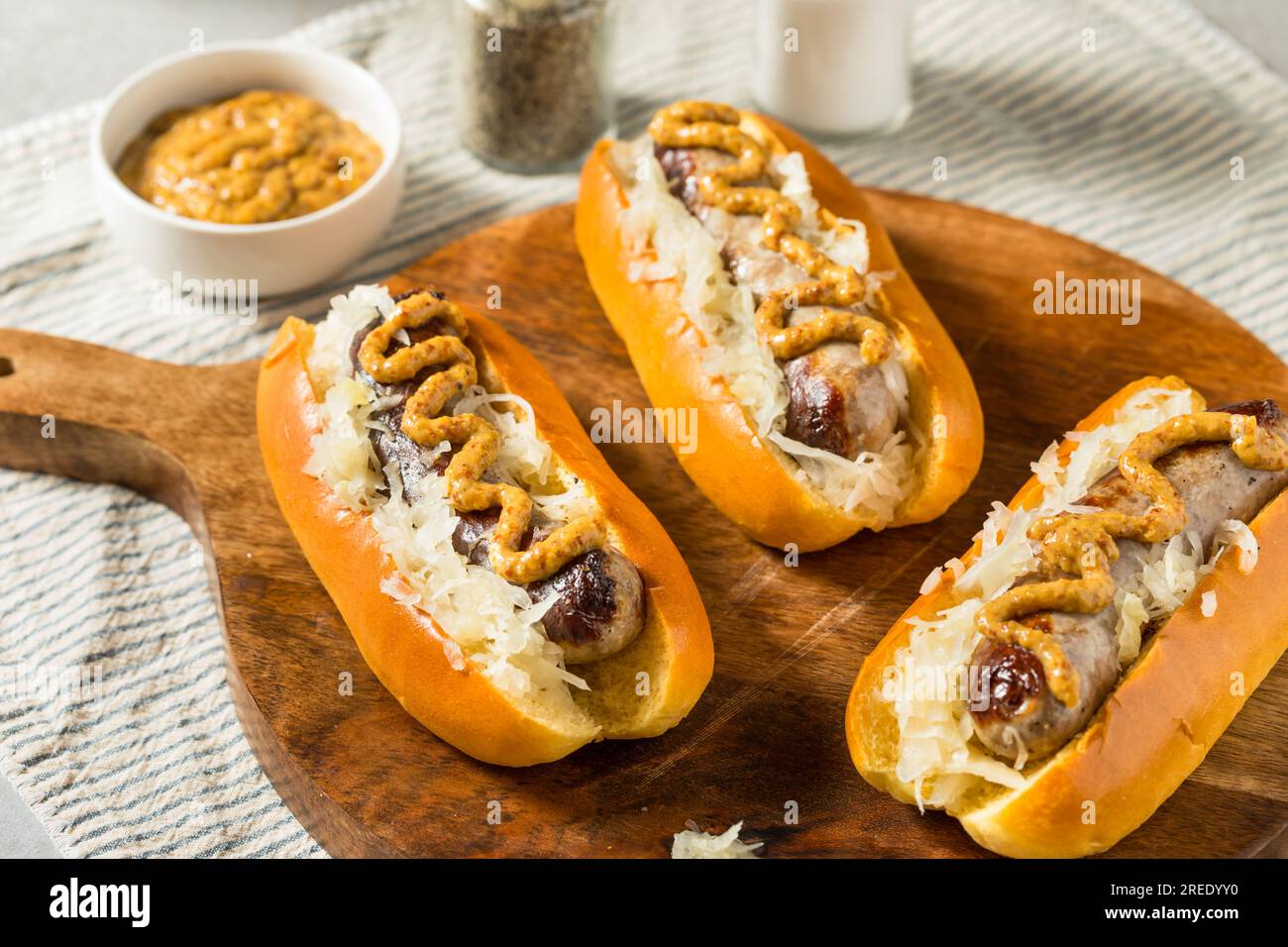 Homemade German Bratwurst Sausage with Mustard and Sauerkraut Stock ...
