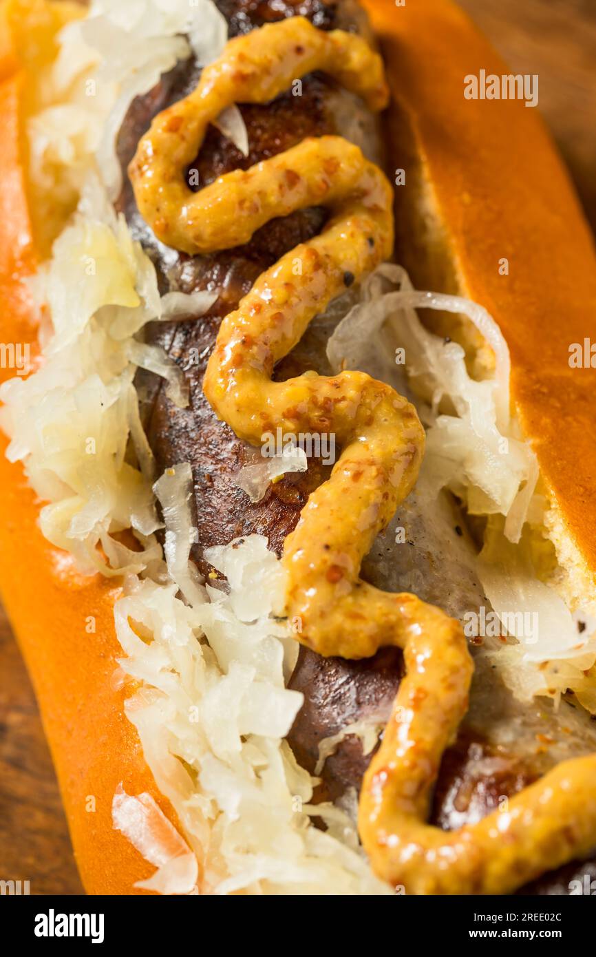 Homemade German Bratwurst Sausage with Mustard and Sauerkraut Stock ...