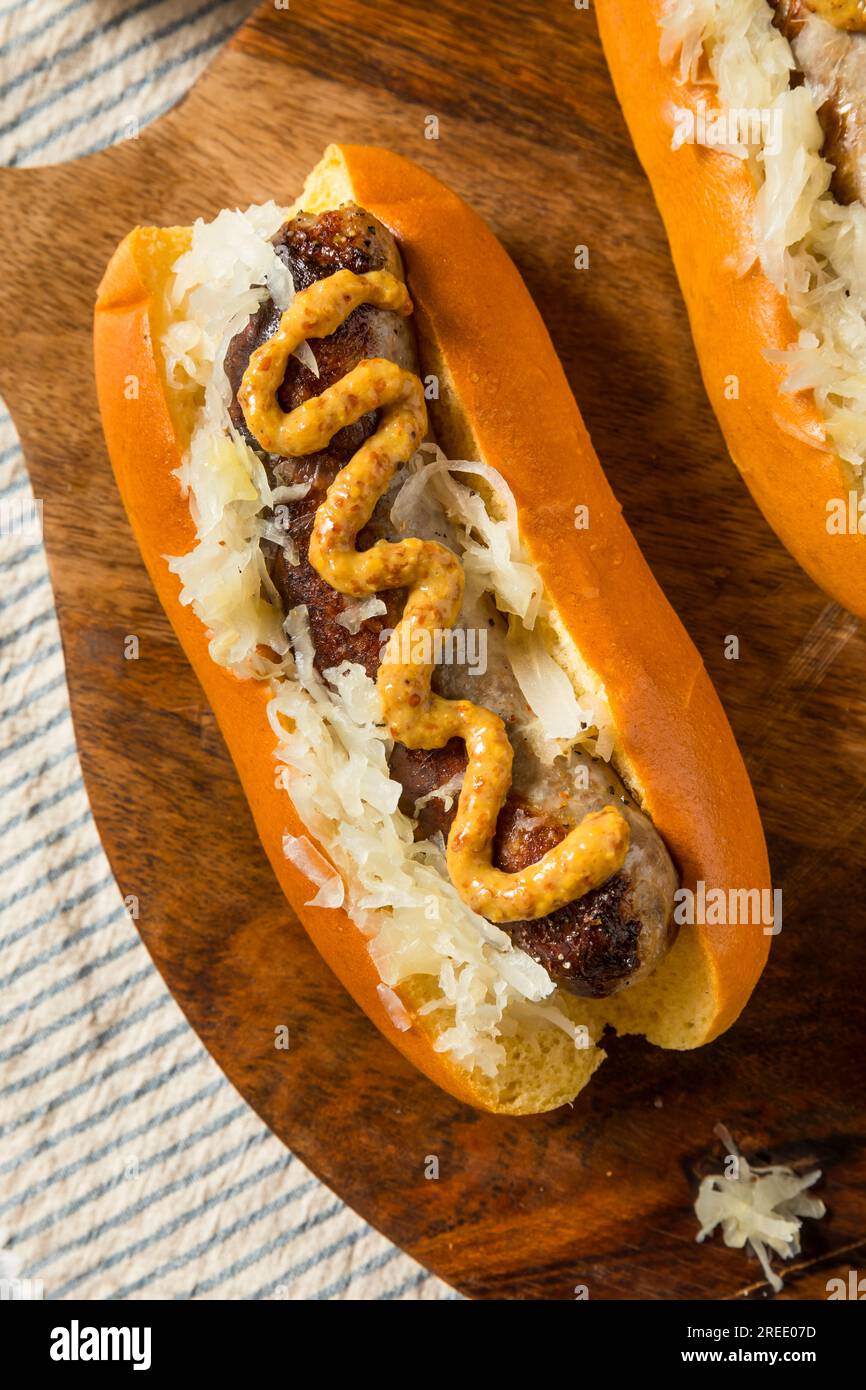 Homemade German Bratwurst Sausage with Mustard and Sauerkraut Stock ...