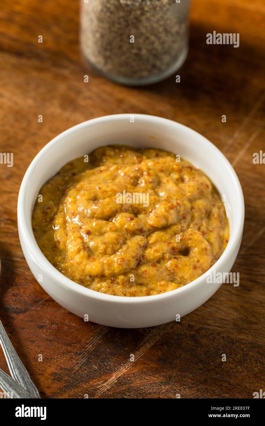 Spicy Stone Ground Yellow Mustard in a Bowl Stock Photo - Alamy