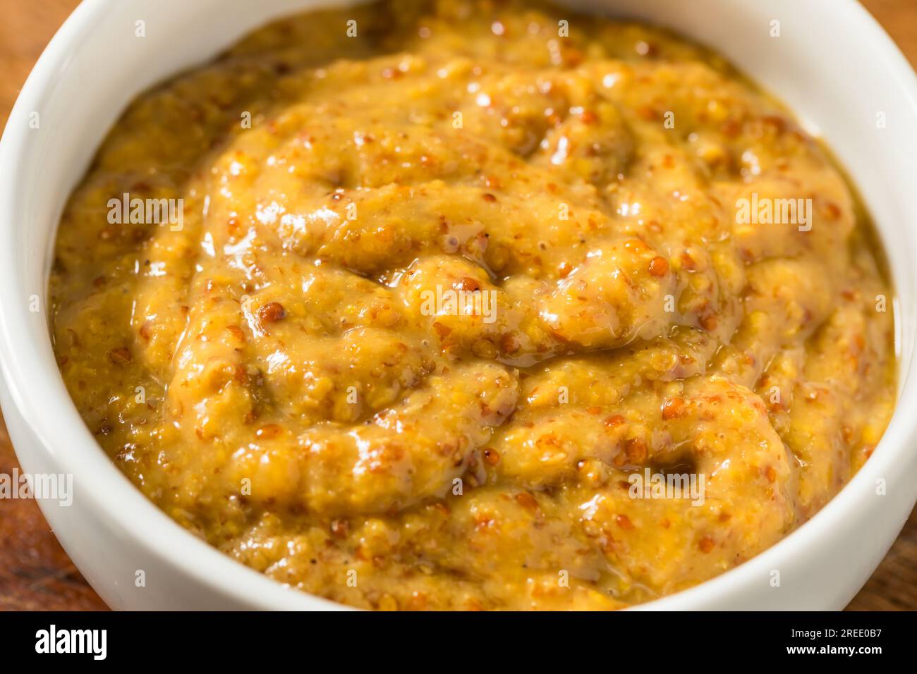 Spicy Stone Ground Yellow Mustard in a Bowl Stock Photo - Alamy