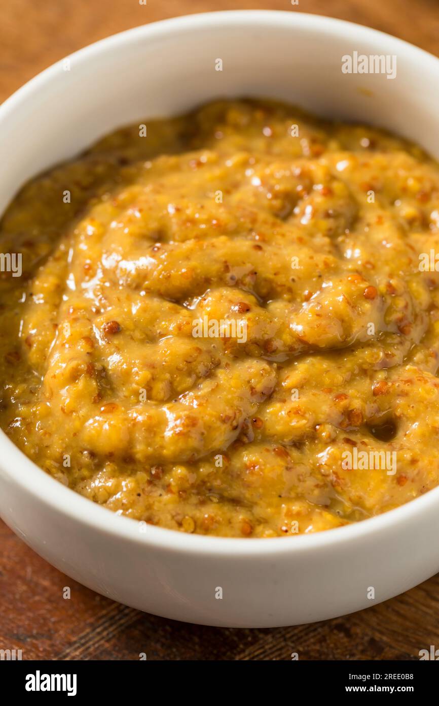 Spicy Stone Ground Yellow Mustard in a Bowl Stock Photo - Alamy