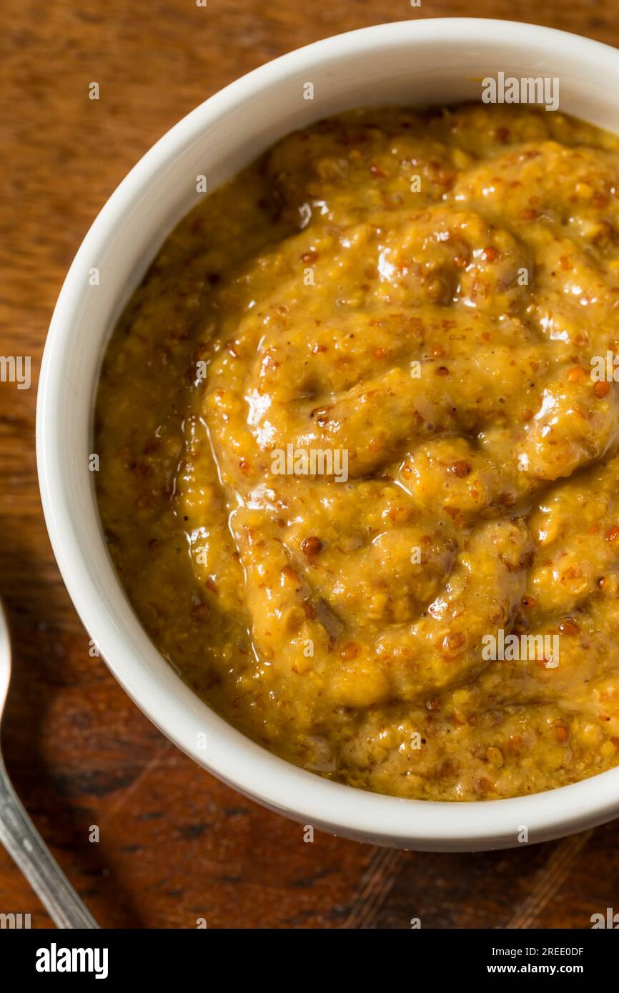Spicy Stone Ground Yellow Mustard in a Bowl Stock Photo - Alamy