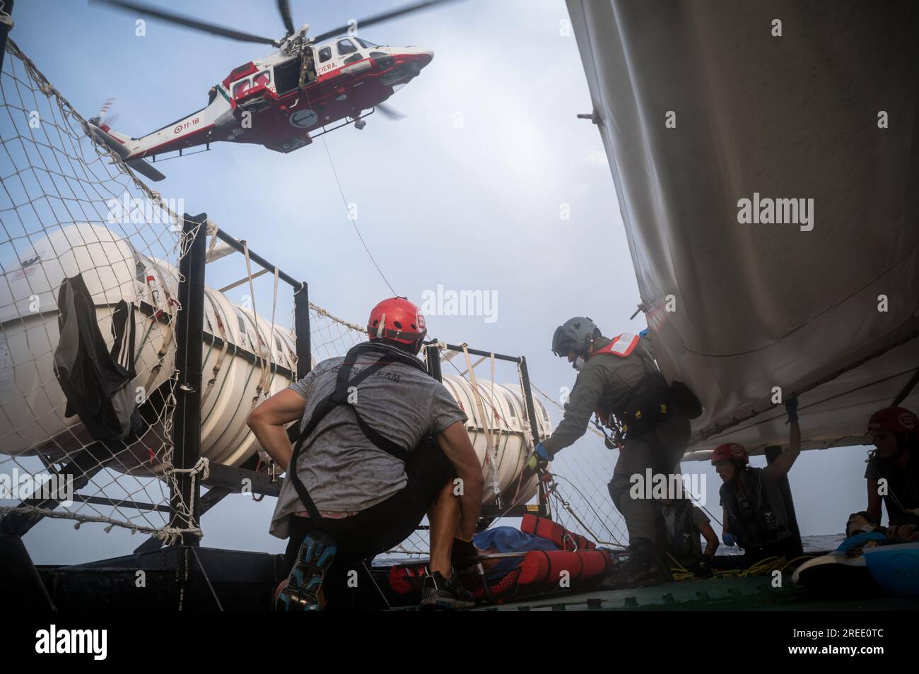 The airplane seen landing for the operation. The Italian Coast Guard ...