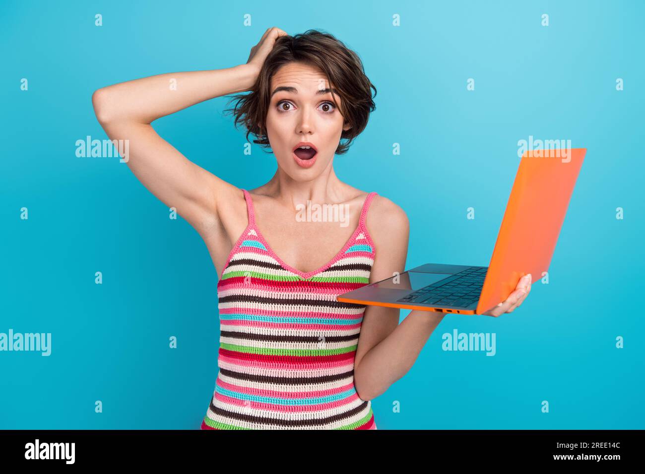 Photo of funny young girl striped singlet surprised unexpected reaction ...