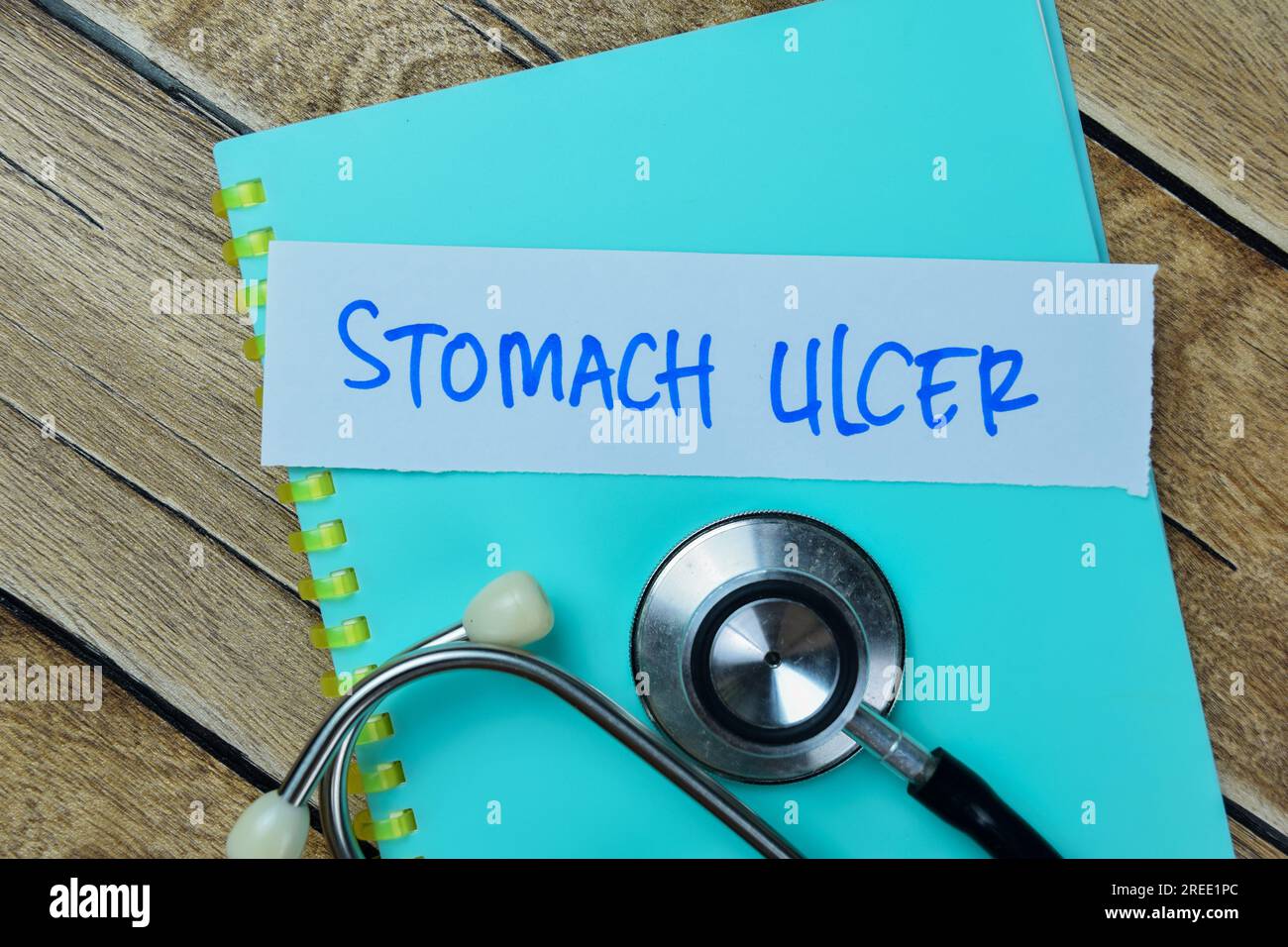 Concept of Stomach Ulcer write on sticky notes with stethoscope ...