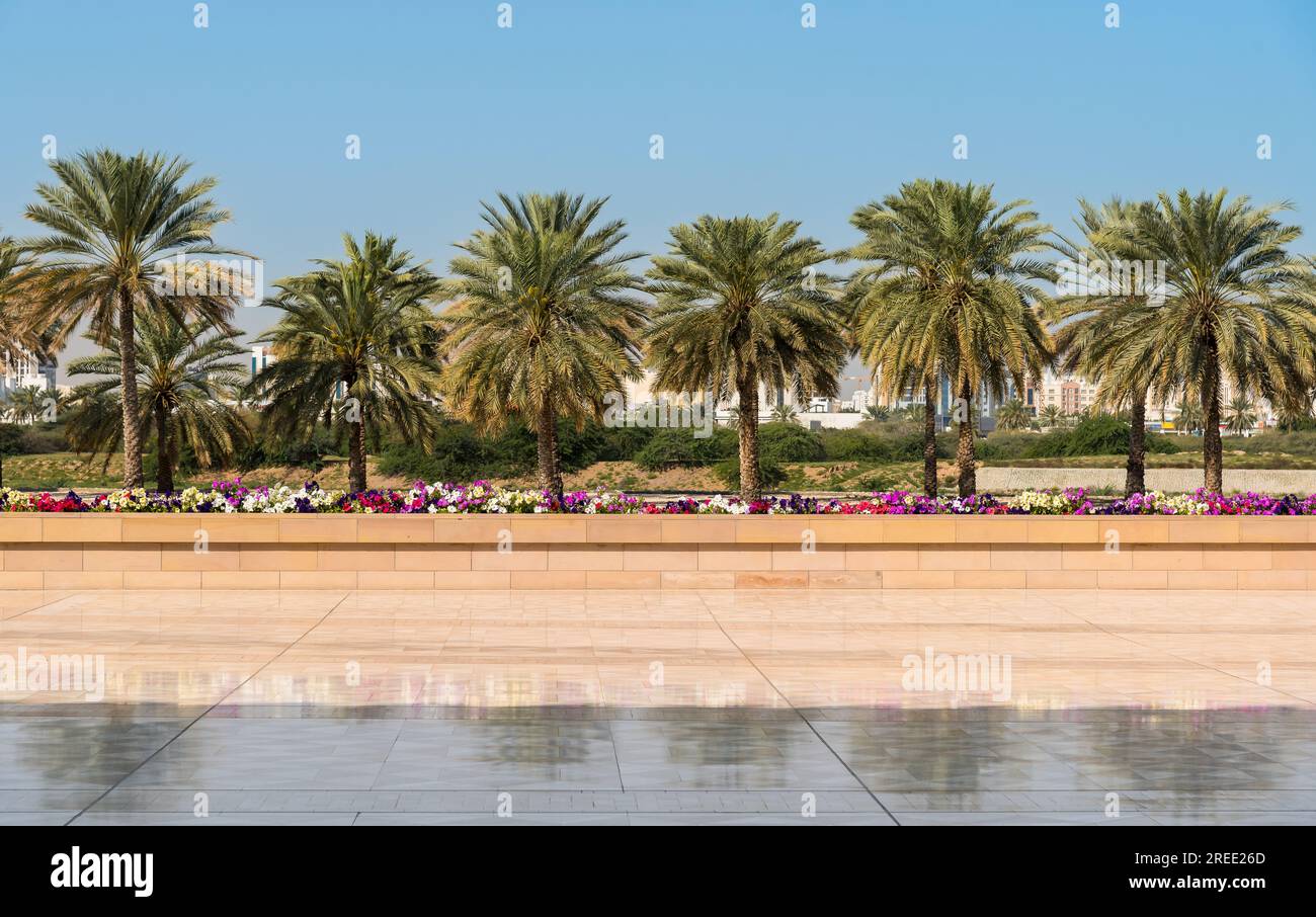 Gardens with palm trees inside the Sultan Qaboos Grand Mosque, Oman ...