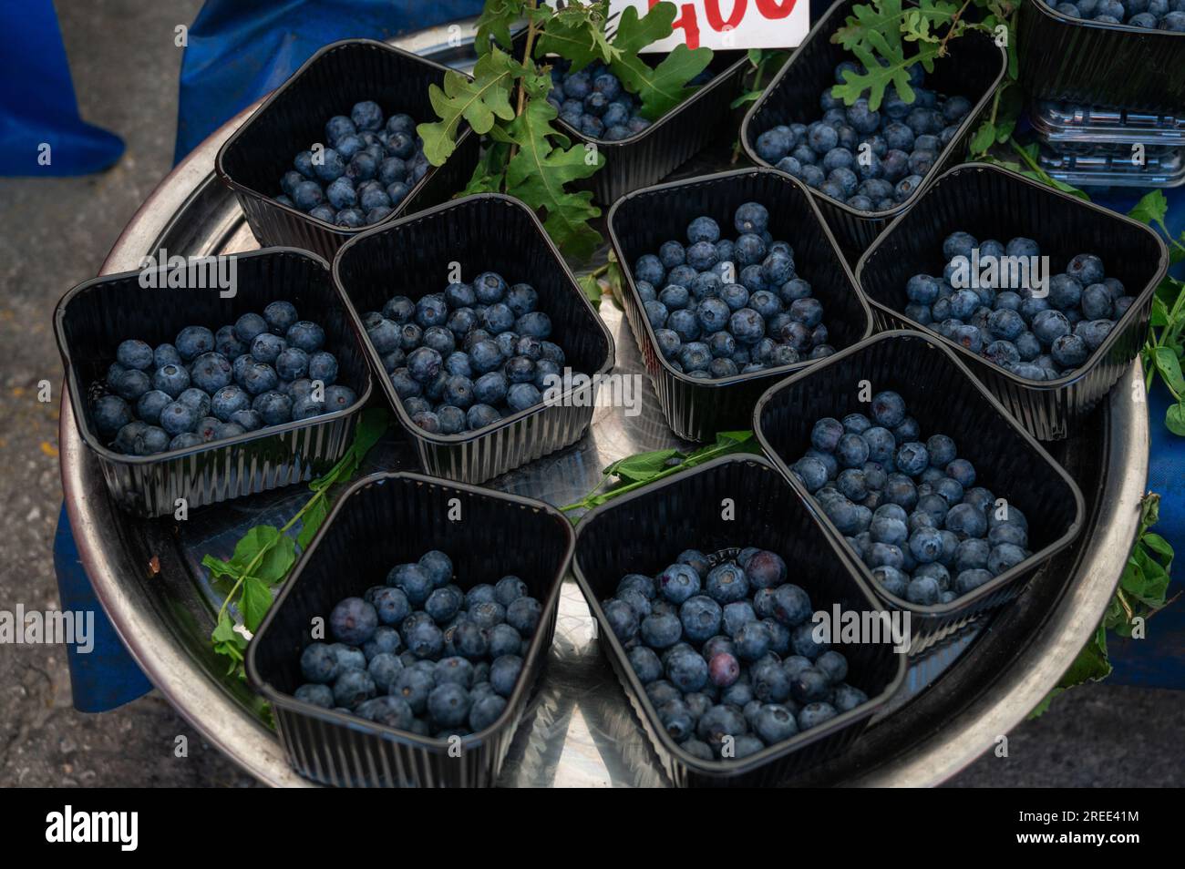 Blueberry sale in the traditional farm Turkish market, a counter filled ...