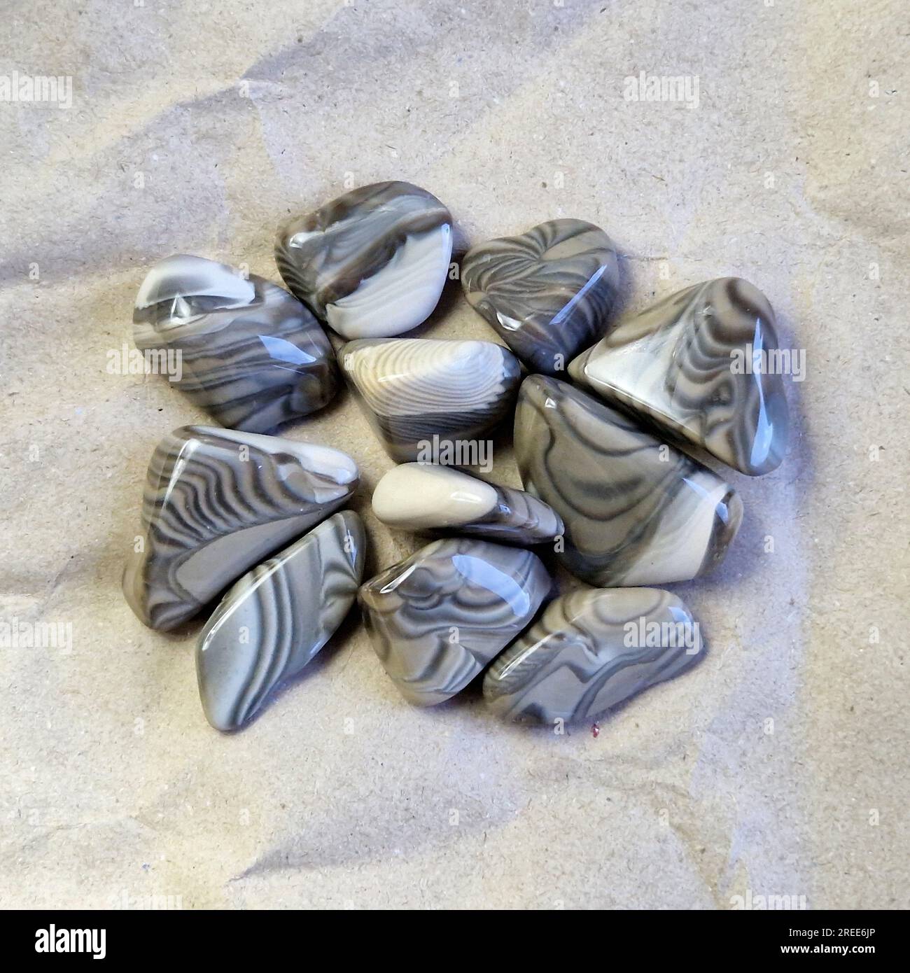 Macro mineral stone Flint on grey craft background close-up top view ...