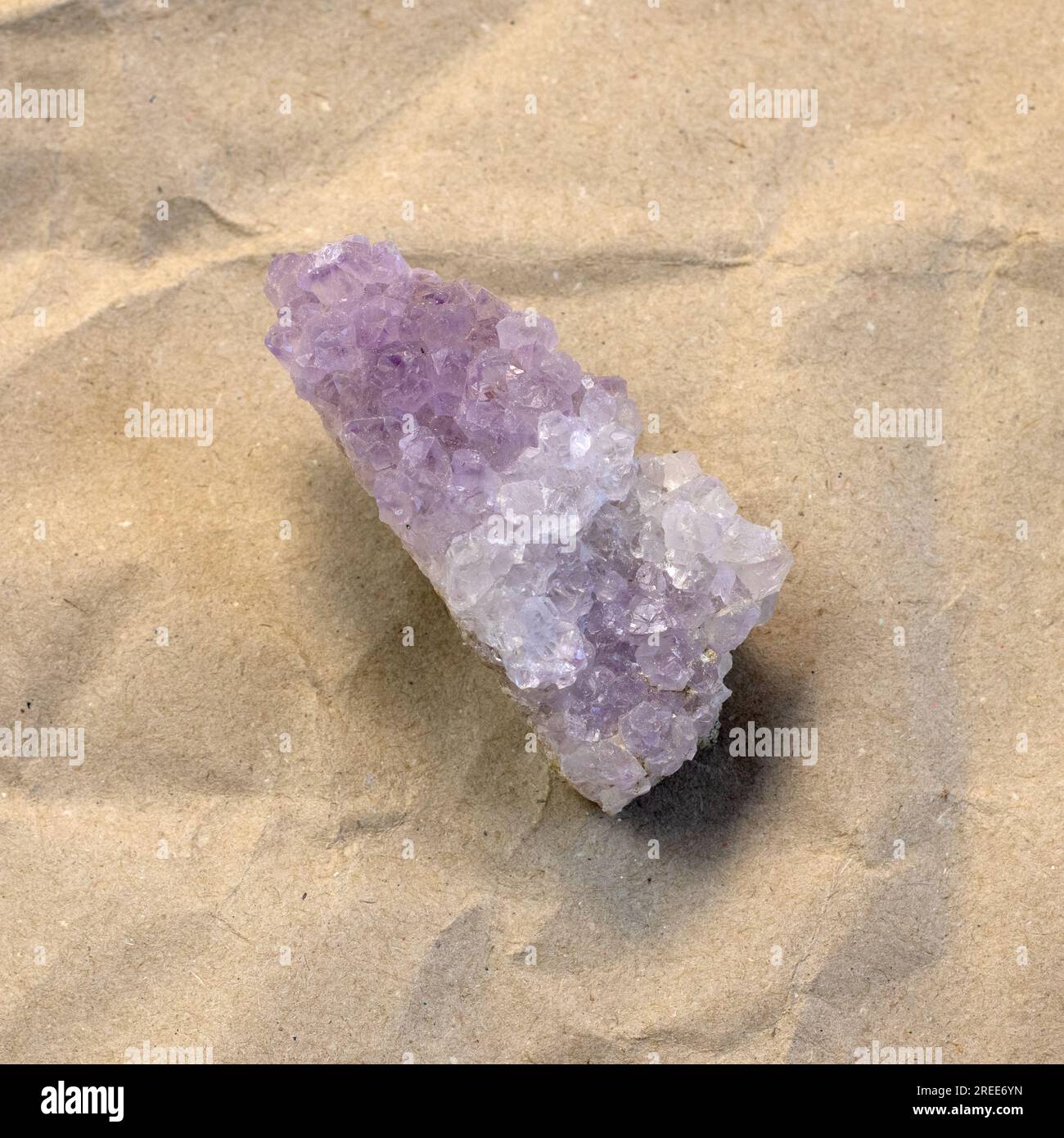 set of various amethyst natural mineral stones and gemstones on grey ...