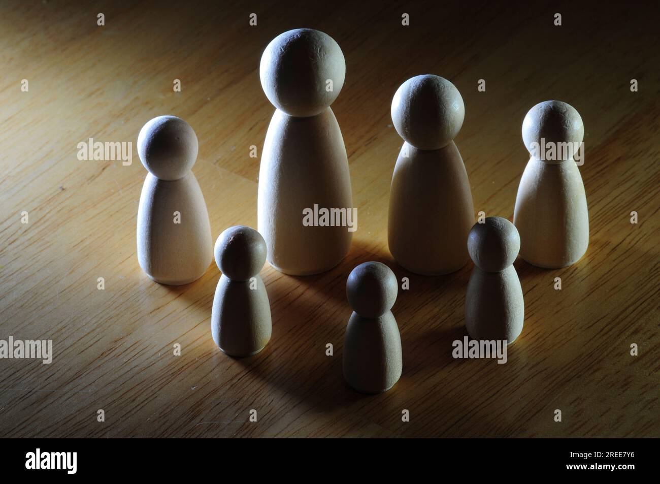 Wooden toy figures or skittles Stock Photo - Alamy