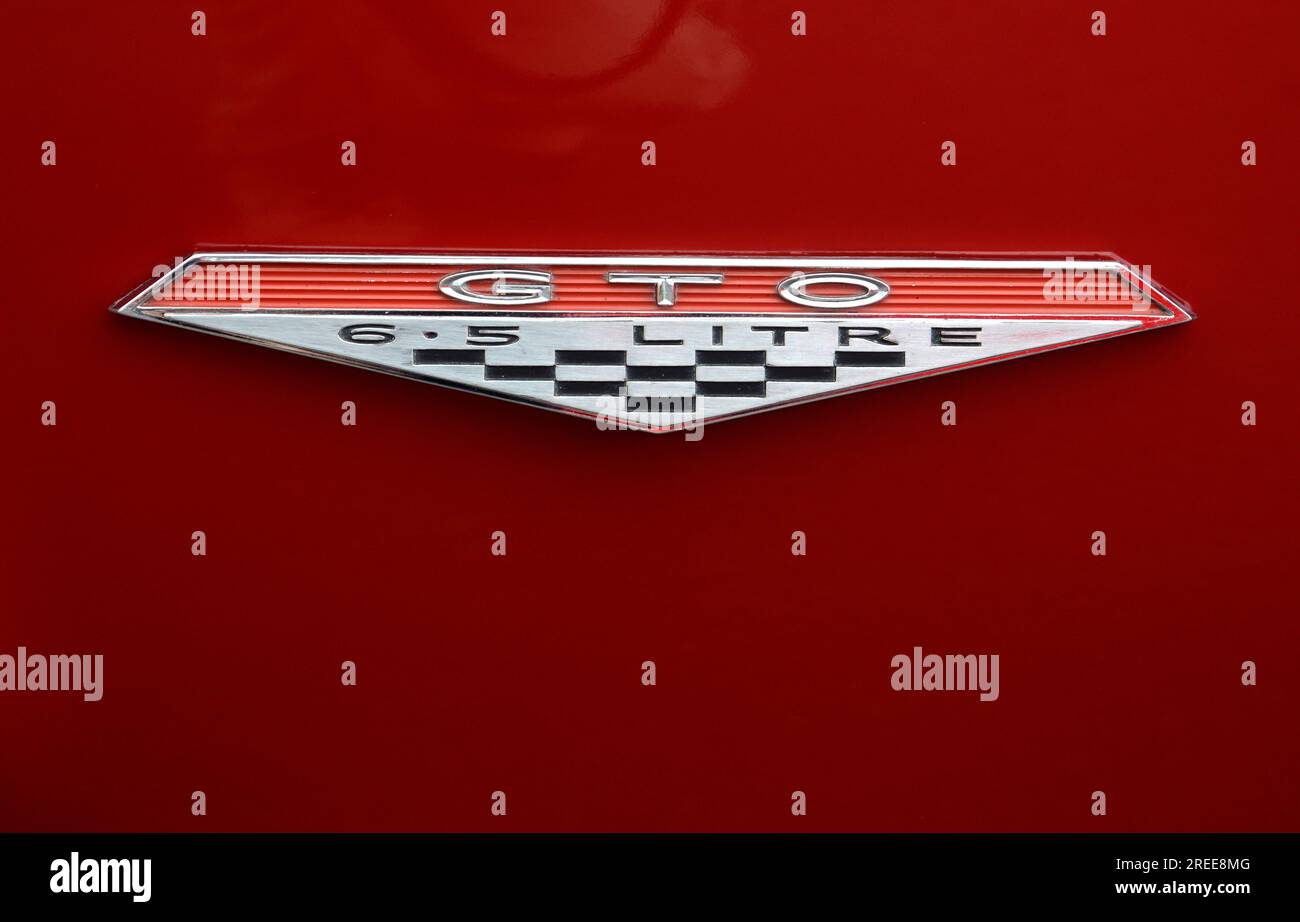 A vintage Pontiac GTO 6.5 litre emblem on a car displayed at a custom ...