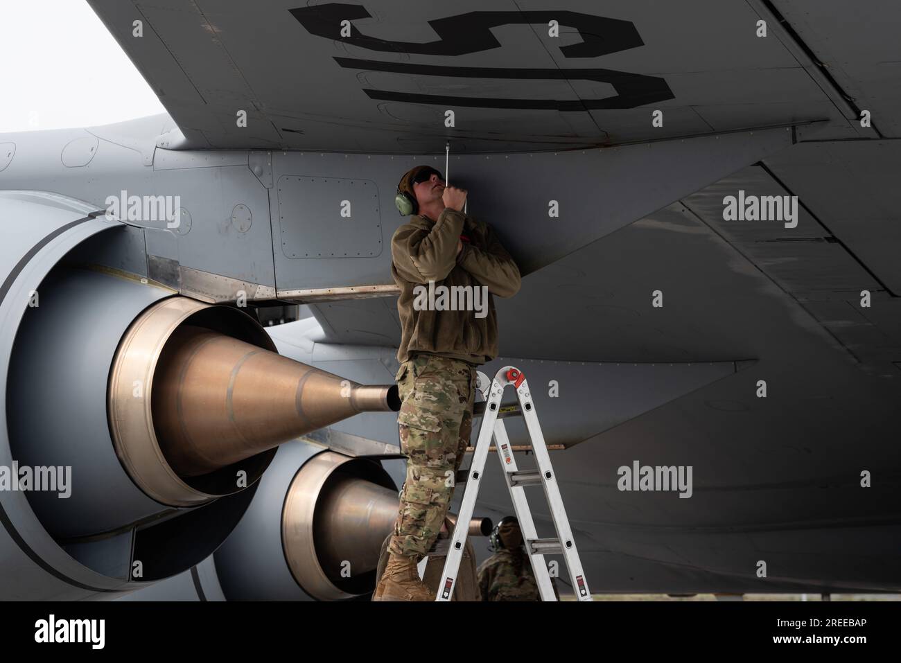 U.S. Air Force crew chief maintenance on a KC-135 at Keflavik Air Base ...