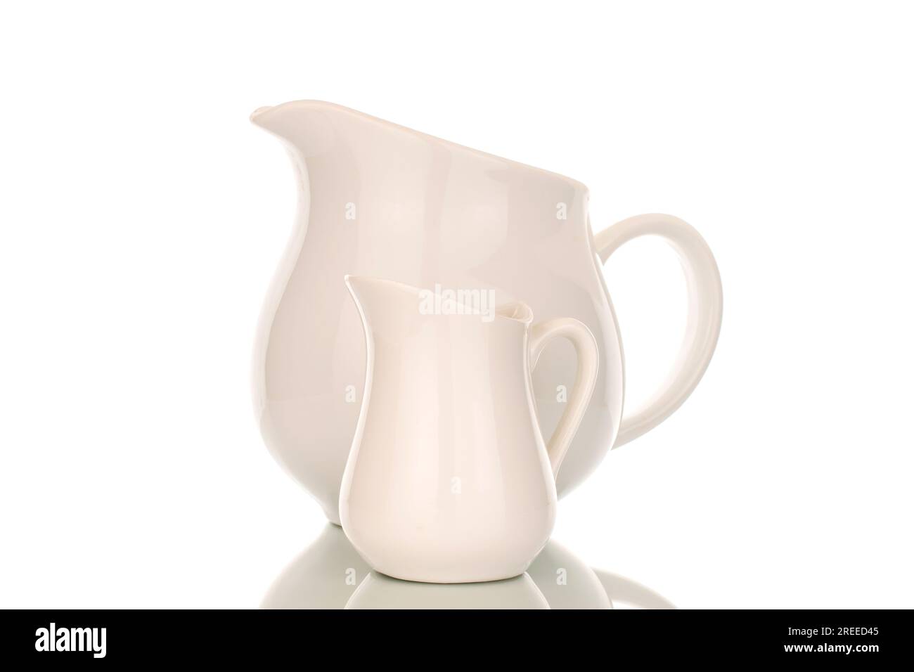 Two ceramic jugs, macro, isolated on white background Stock Photo - Alamy