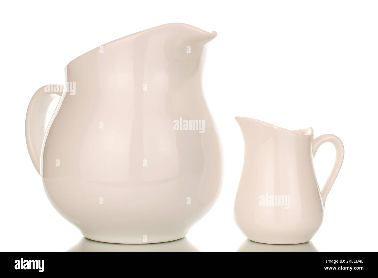 Two ceramic jugs, macro, isolated on white background Stock Photo - Alamy