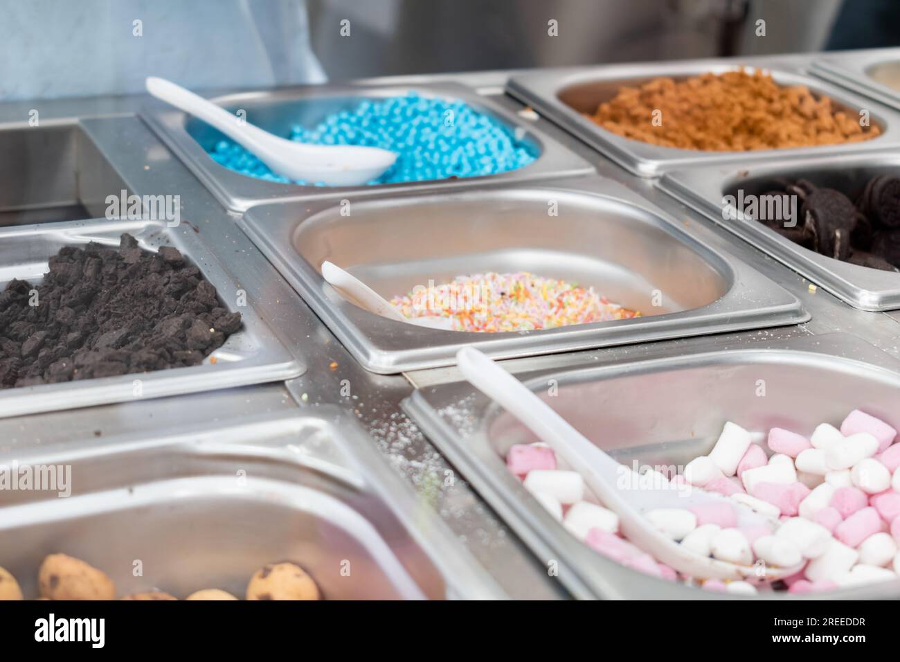 Different toppings for topping waffles at a street food stand Stock ...