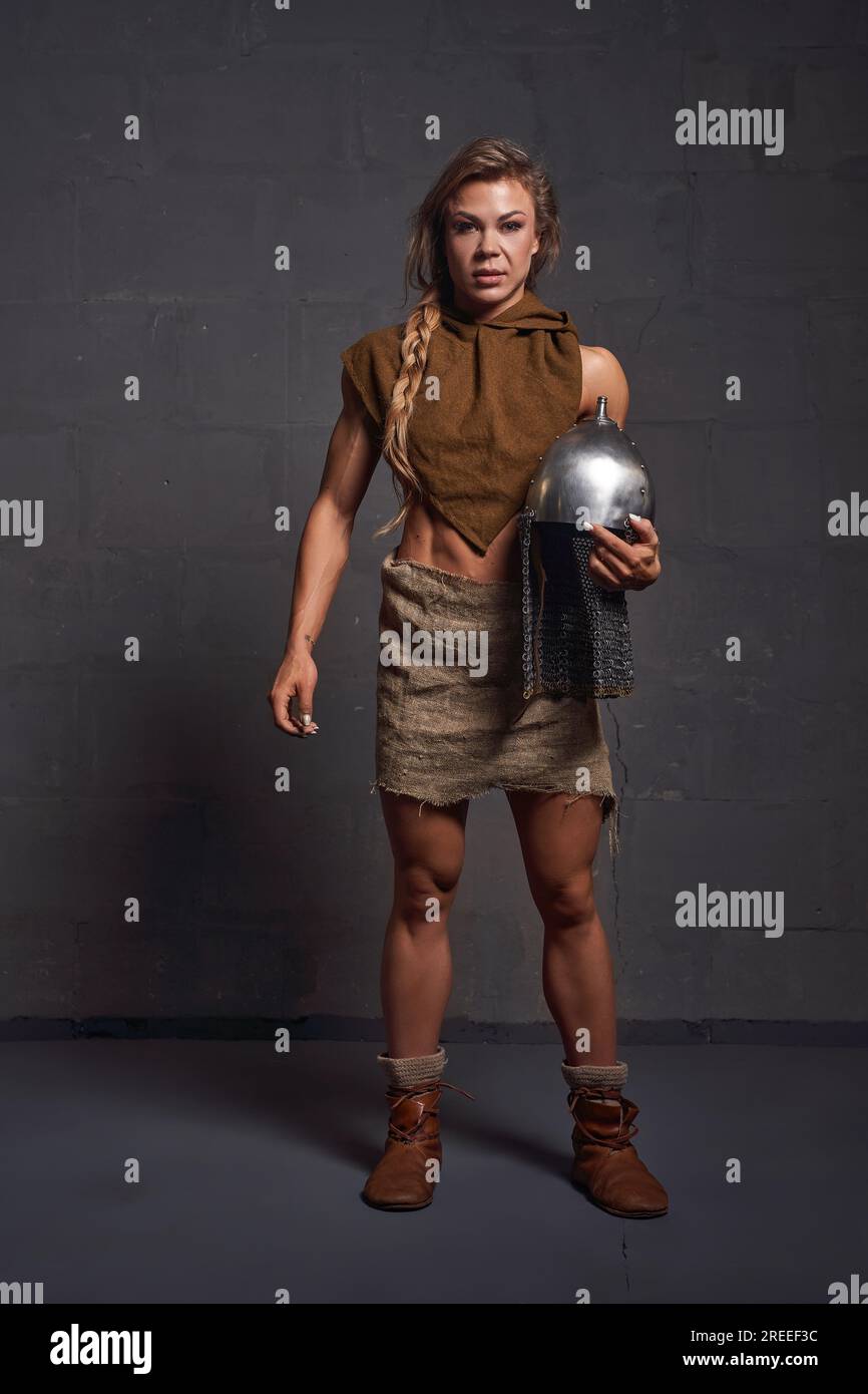 Strong woman warrior after fight Stock Photo - Alamy