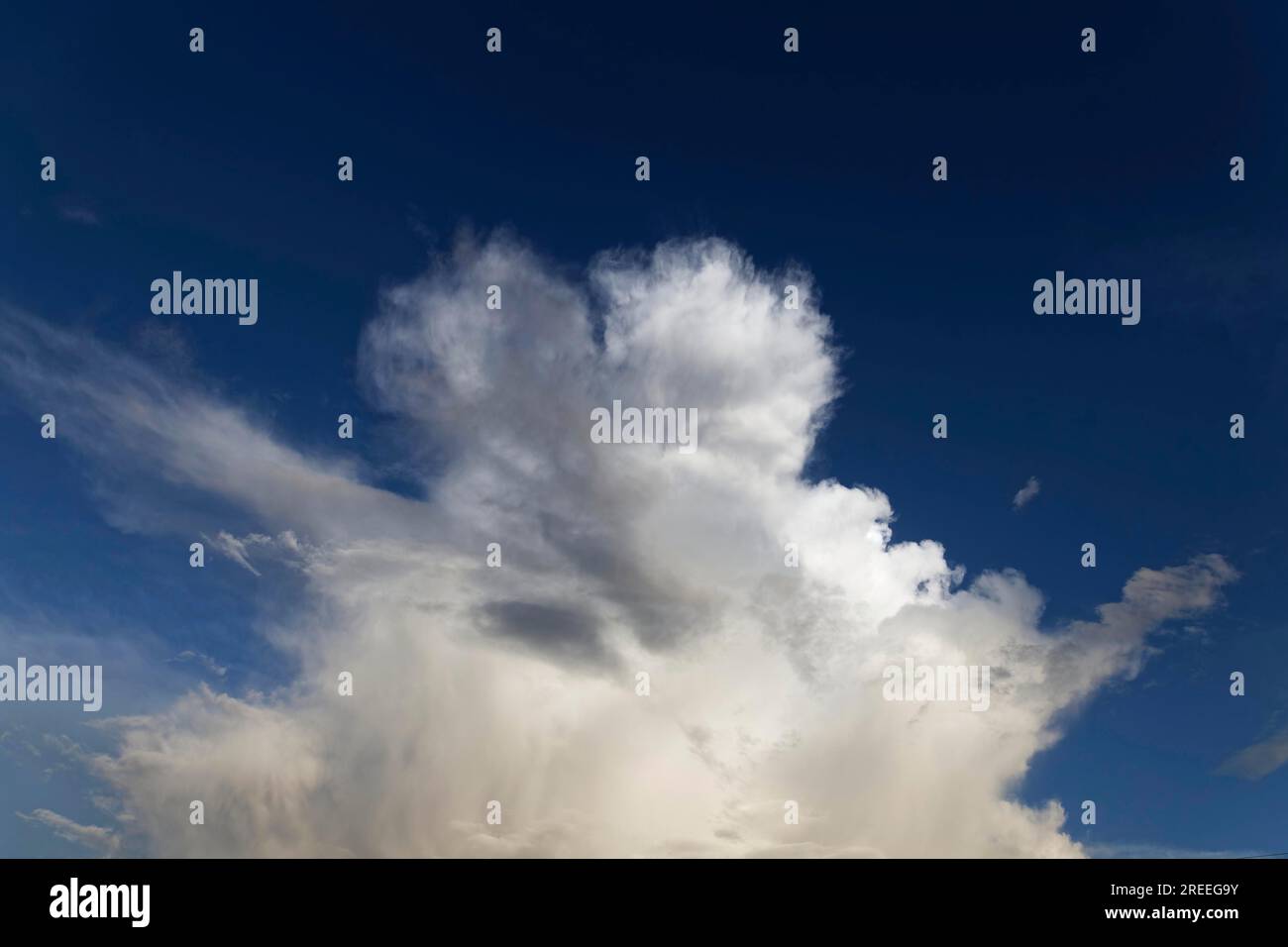White cloud against blue sky, Province of Quebec, Canada Stock Photo ...