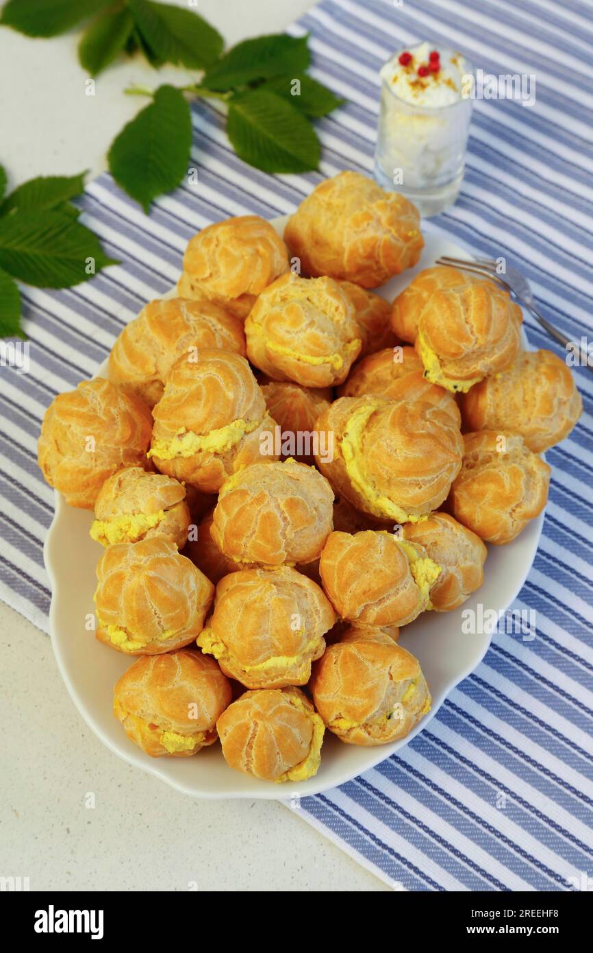 Swabian cuisine, mini cream puffs filled with goat's cream cheese ...