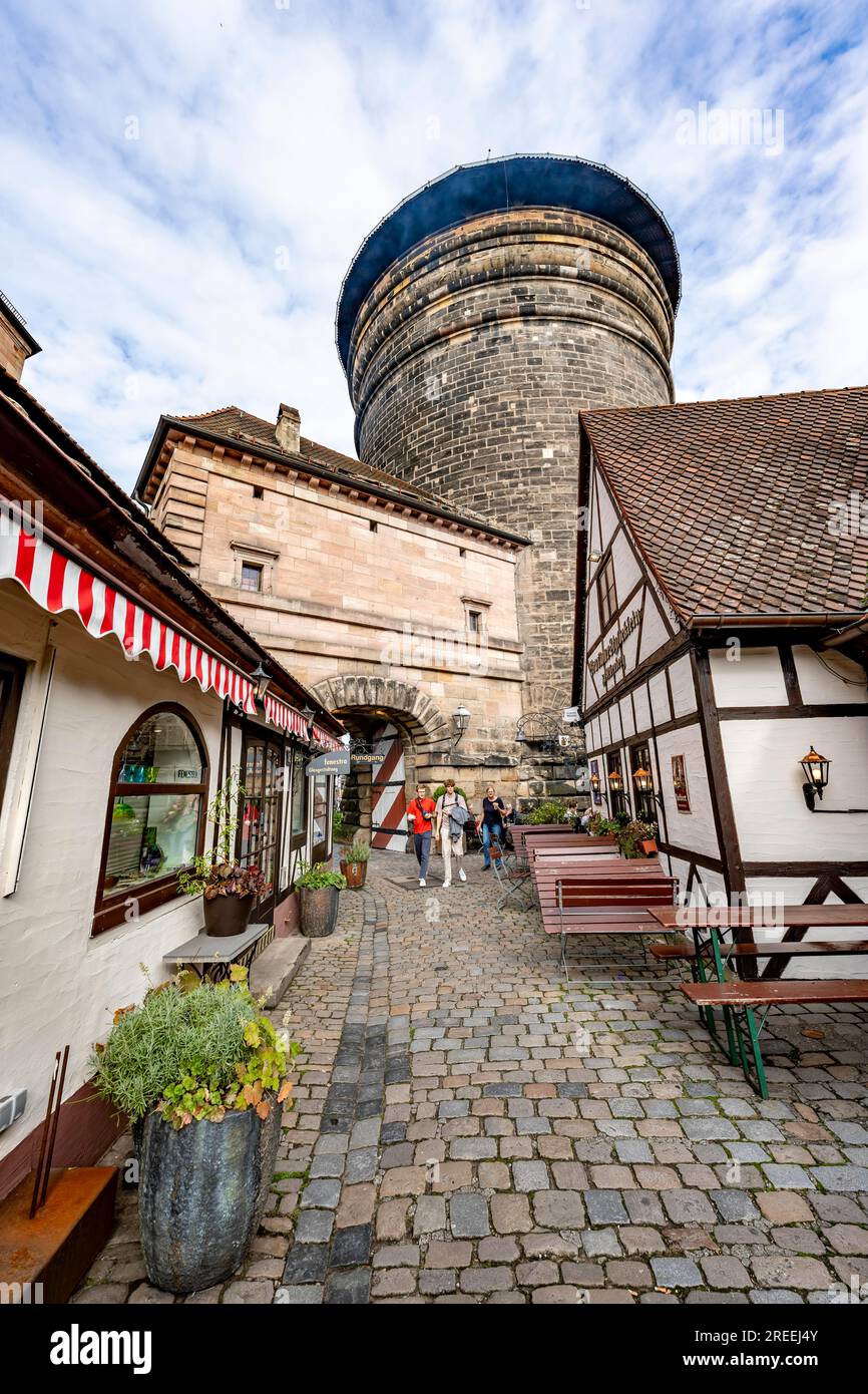 Alley with small shops in the Handwerkerhof, behind Frauentorturm ...
