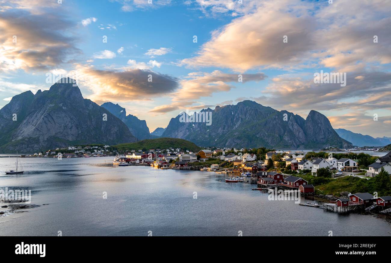 Village view of the fishing village Reine, traditional red Rorbuer ...