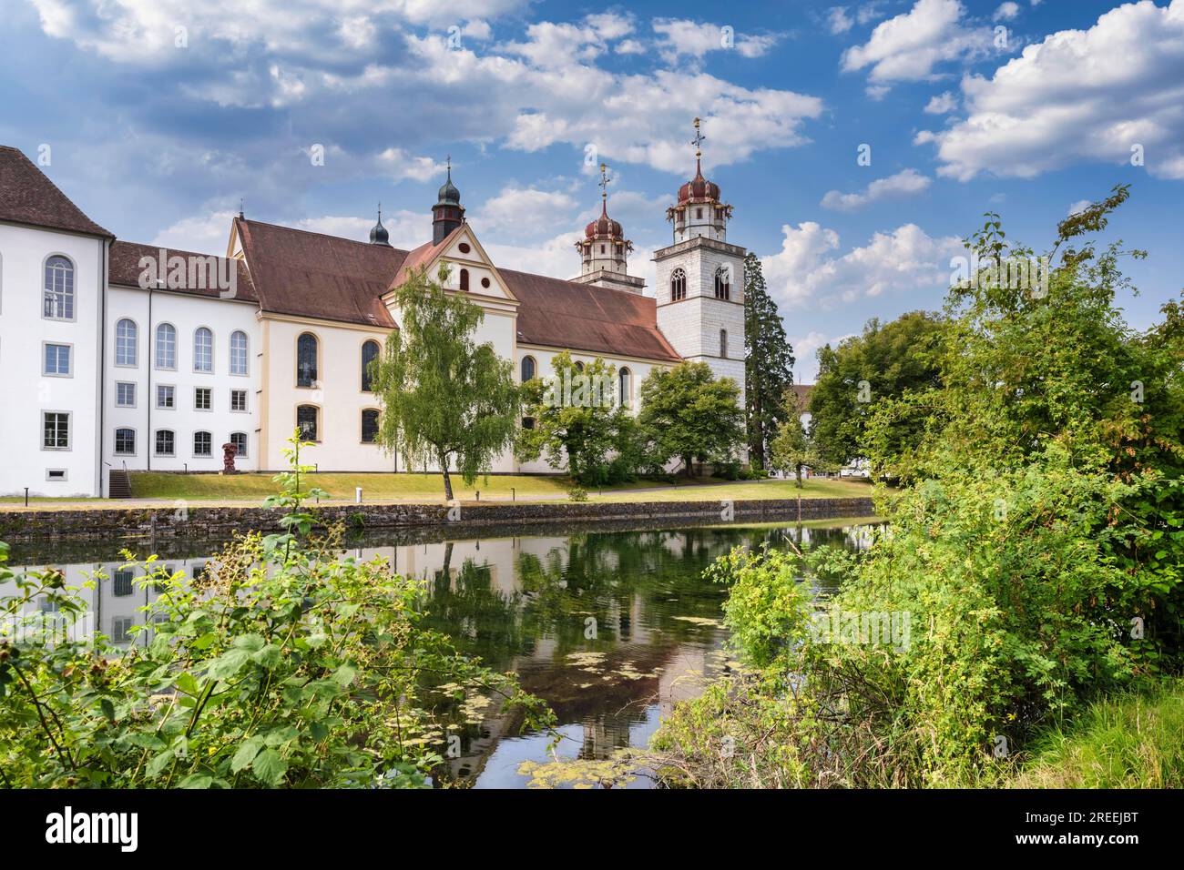 The monastery church of St. Mary with the former Benedictine abbey on ...
