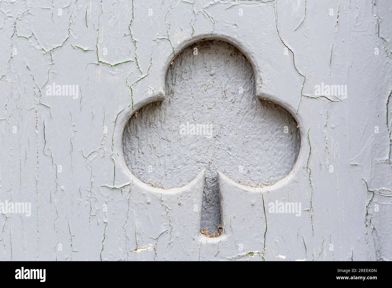 Old grungy shamrock sign shaped in a wood wall Stock Photo - Alamy