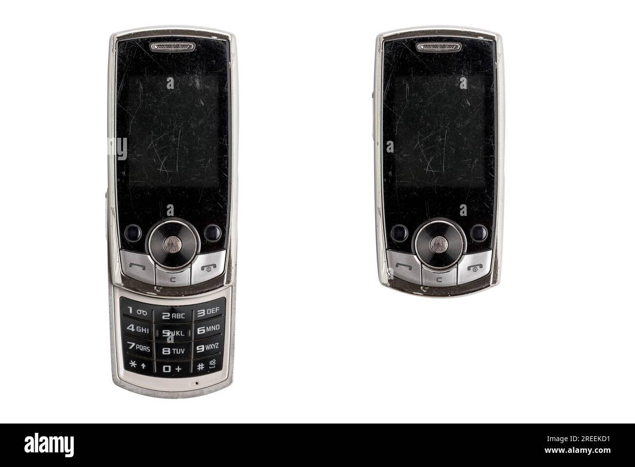 Very old scratched mobile phone, isolated on white Stock Photo - Alamy