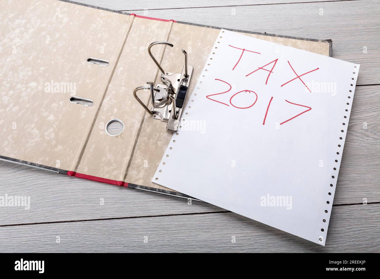 Preparing an empty file folder for the tax clearance 2017 Stock Photo ...