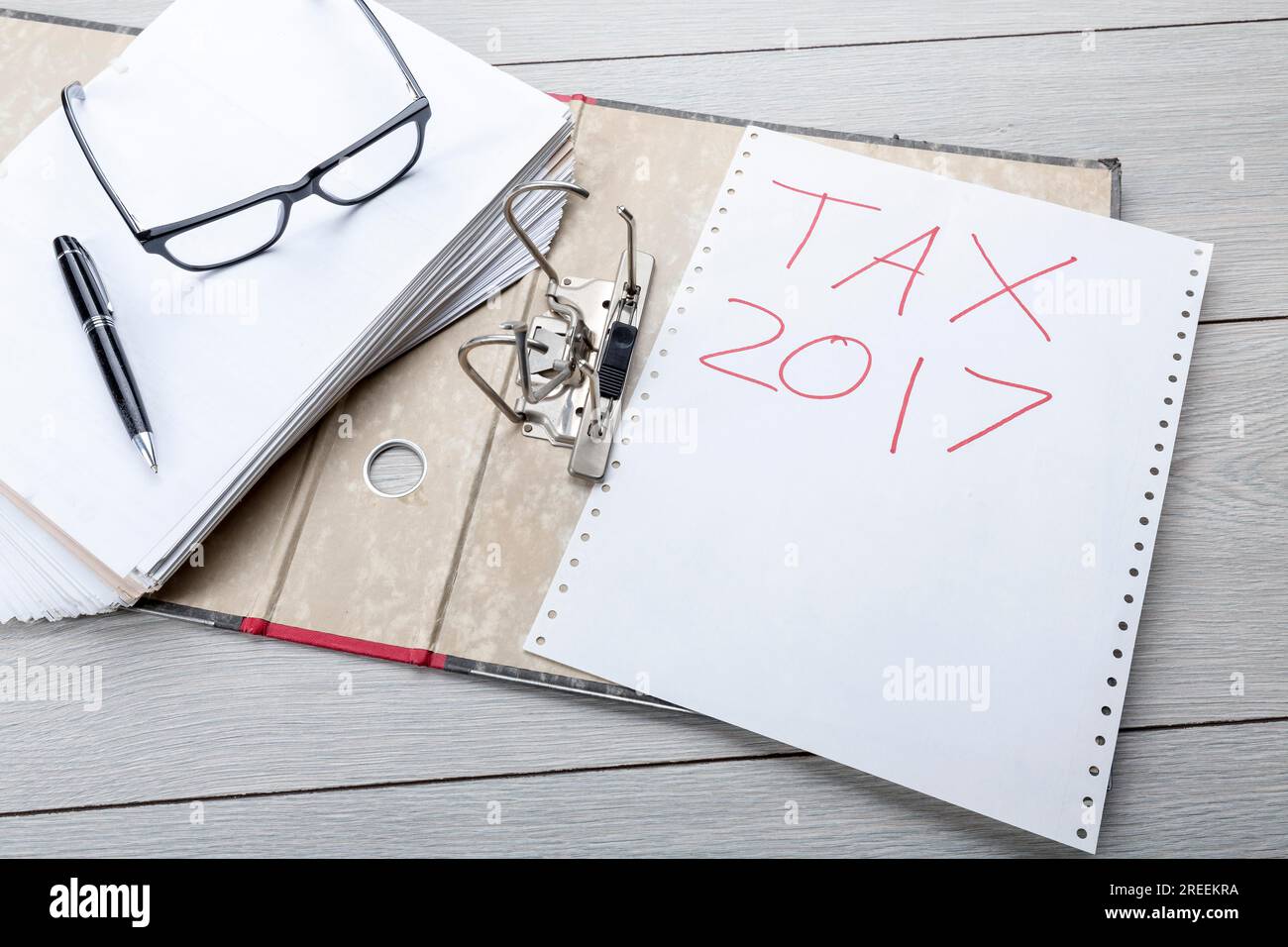 Preparing an empty file folder for the tax clearance 2017 Stock Photo ...
