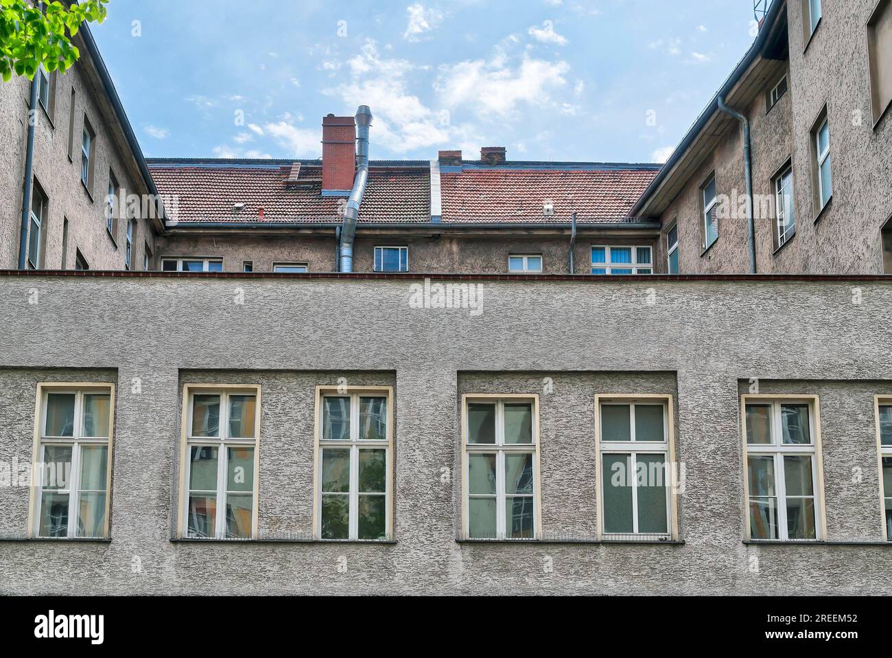 Sparse old house in Berlin with blue sky Stock Photo - Alamy